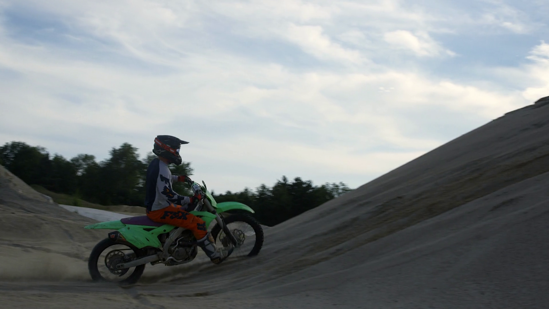 Dirt Biker Rides Berm Kicks Up Sand On Sunny Stock Footage SBV ...