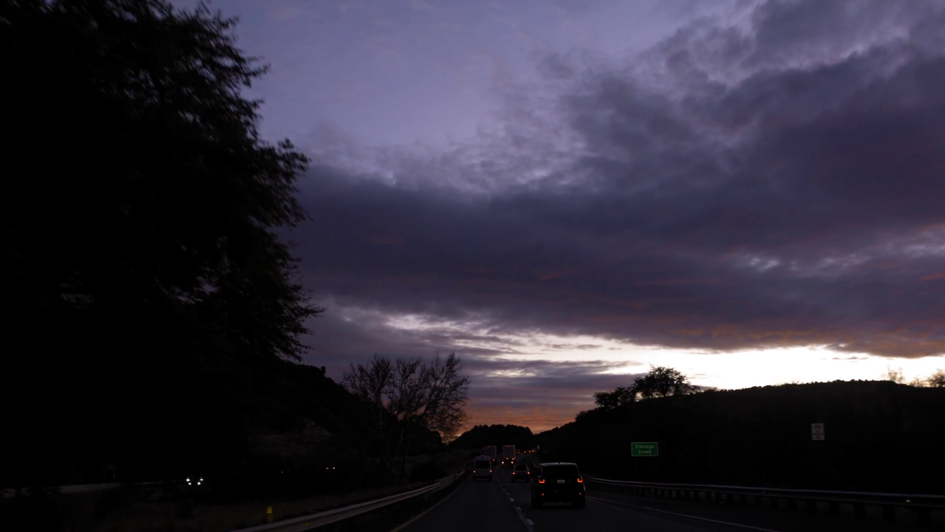 Driving Along Dark Highway At Sunset With Stock Footage SBV-351745485 ...