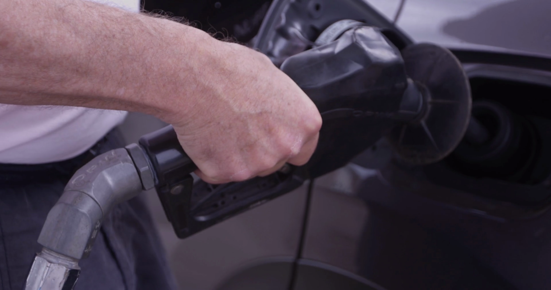 Man Finsihes Pumping Gas At Gas Pump Close Up Stock Footage SBV ...