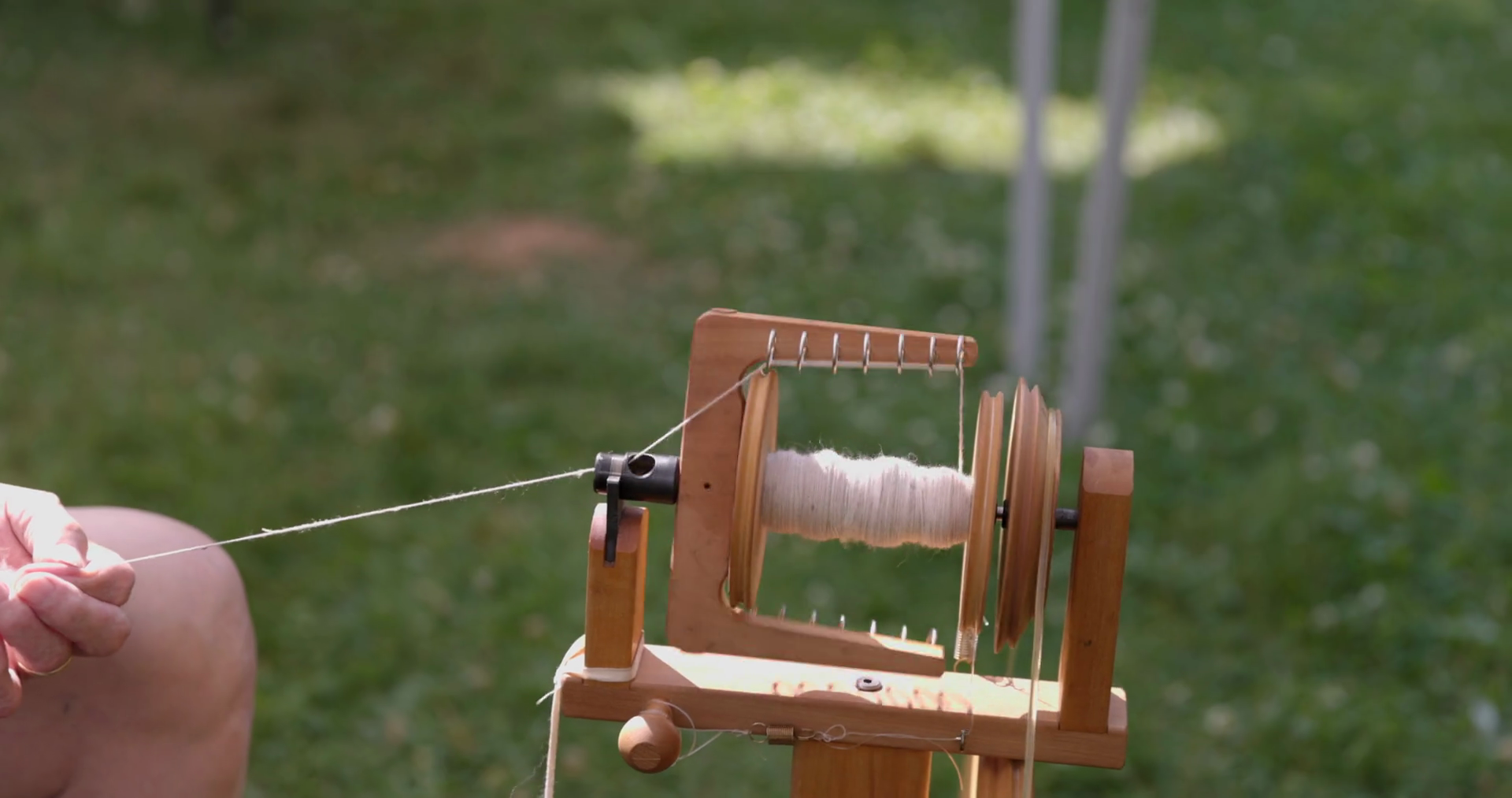 Using Small Spinning Loom Outdoors: Close-up Stock Footage SBV ...