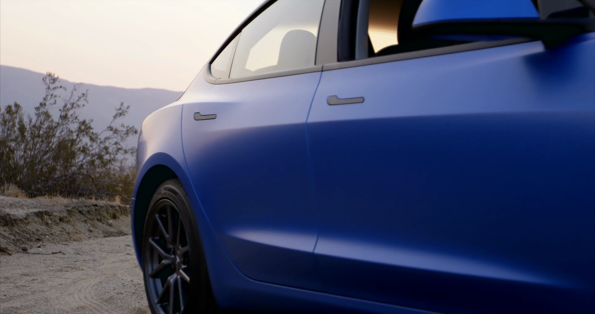 Tesla Model 3 Car On Side Of Desert Highway Stock Footage SBV-347708623 ...