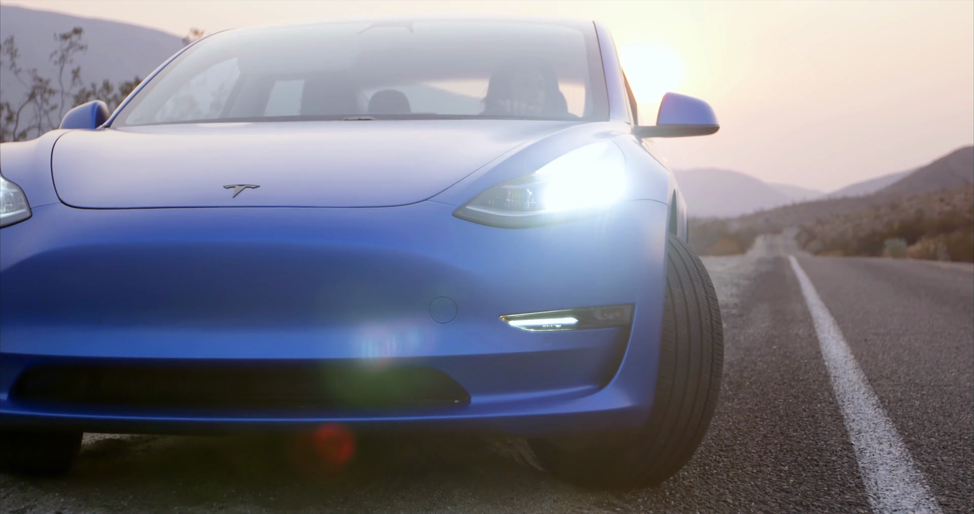 Tesla Model 3 Car On Side Of Desert Highway Stock Footage SBV-347708563 ...
