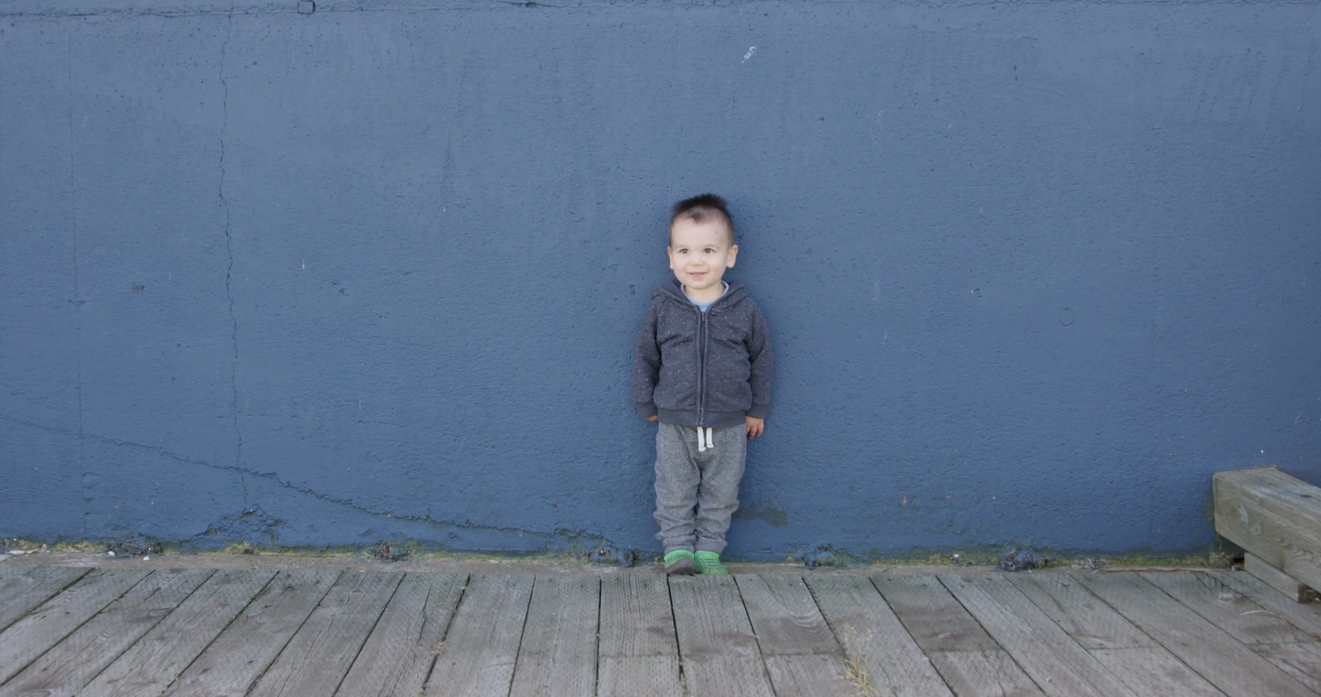 Toddler Boy Standing Straight On Blue Wall Stock Footage SBV-347706827 ...