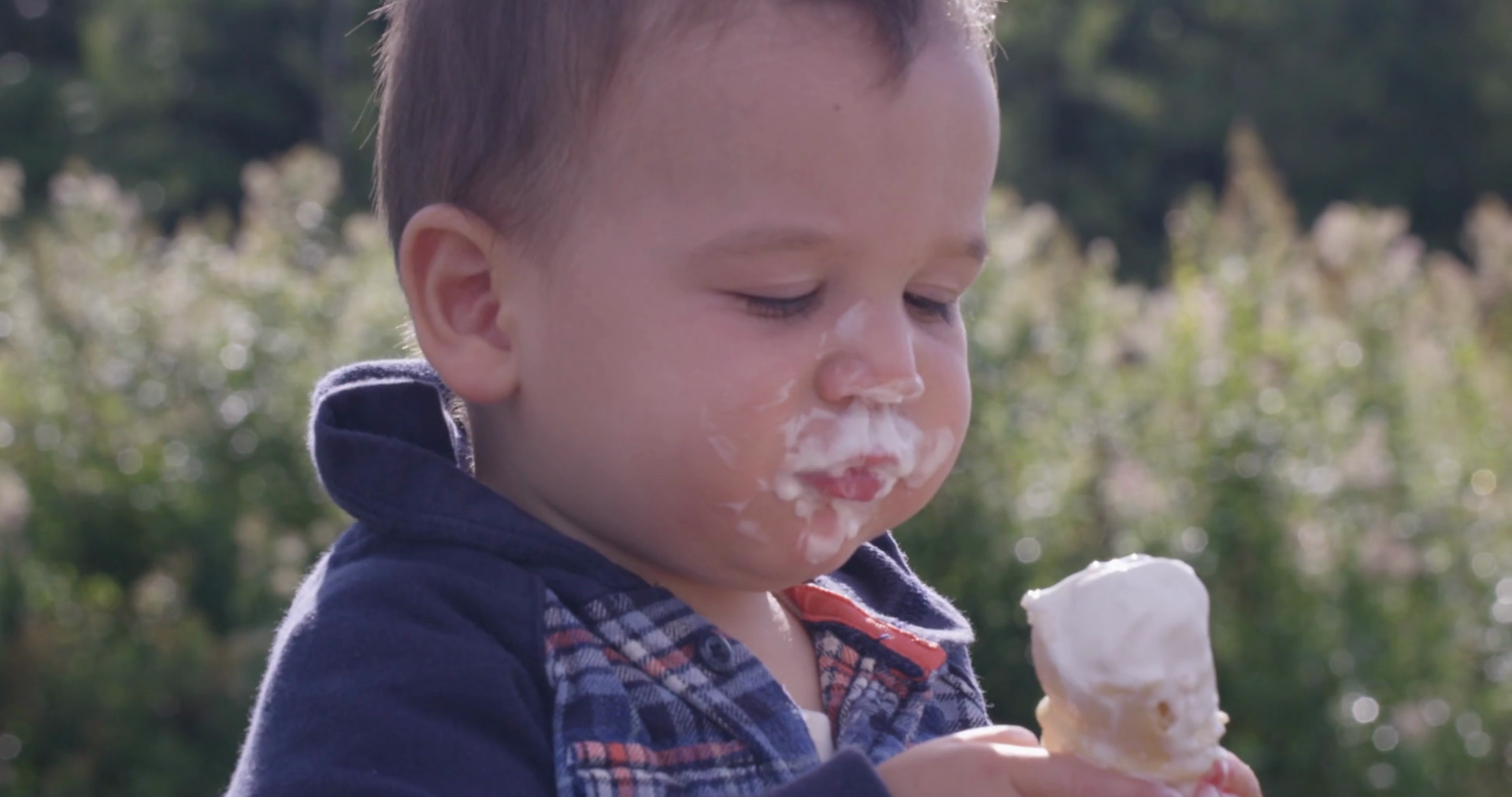 Toddler Boy Taking Bite Of Icecream Cone Stock Footage SBV-347706810 ...