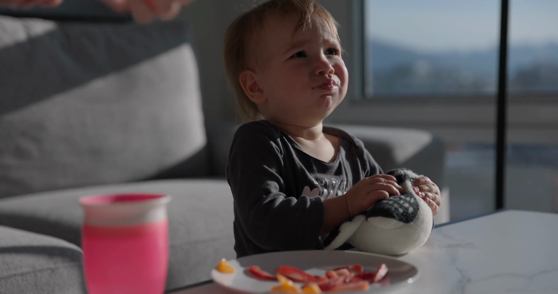 Toddler Eats Fruit Off Plate Watching Tv Stock Footage SBV-347754362 ...