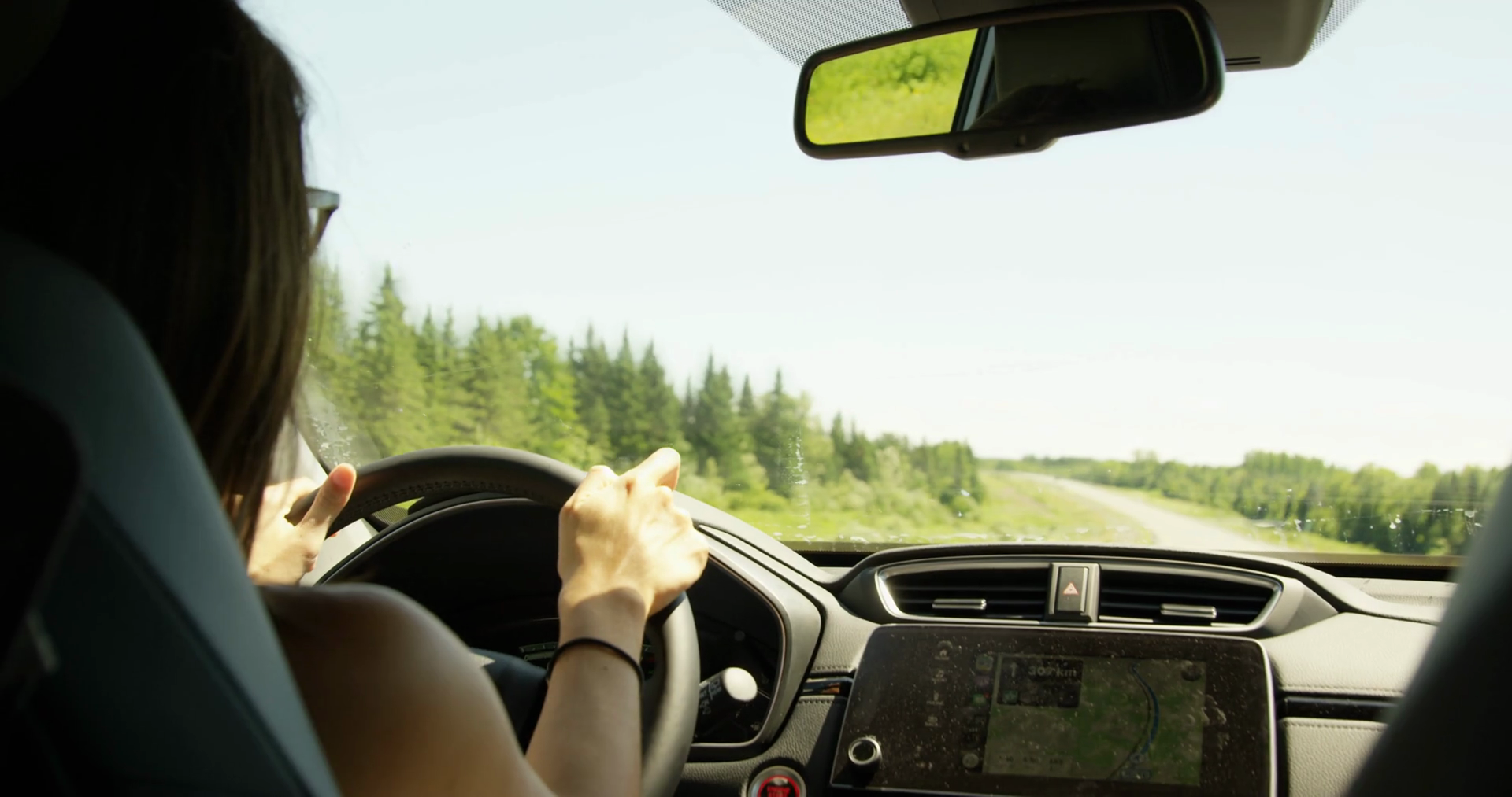 Woman Drives Down Road Alone Slow Motion Stock Footage SBV-347706237 ...