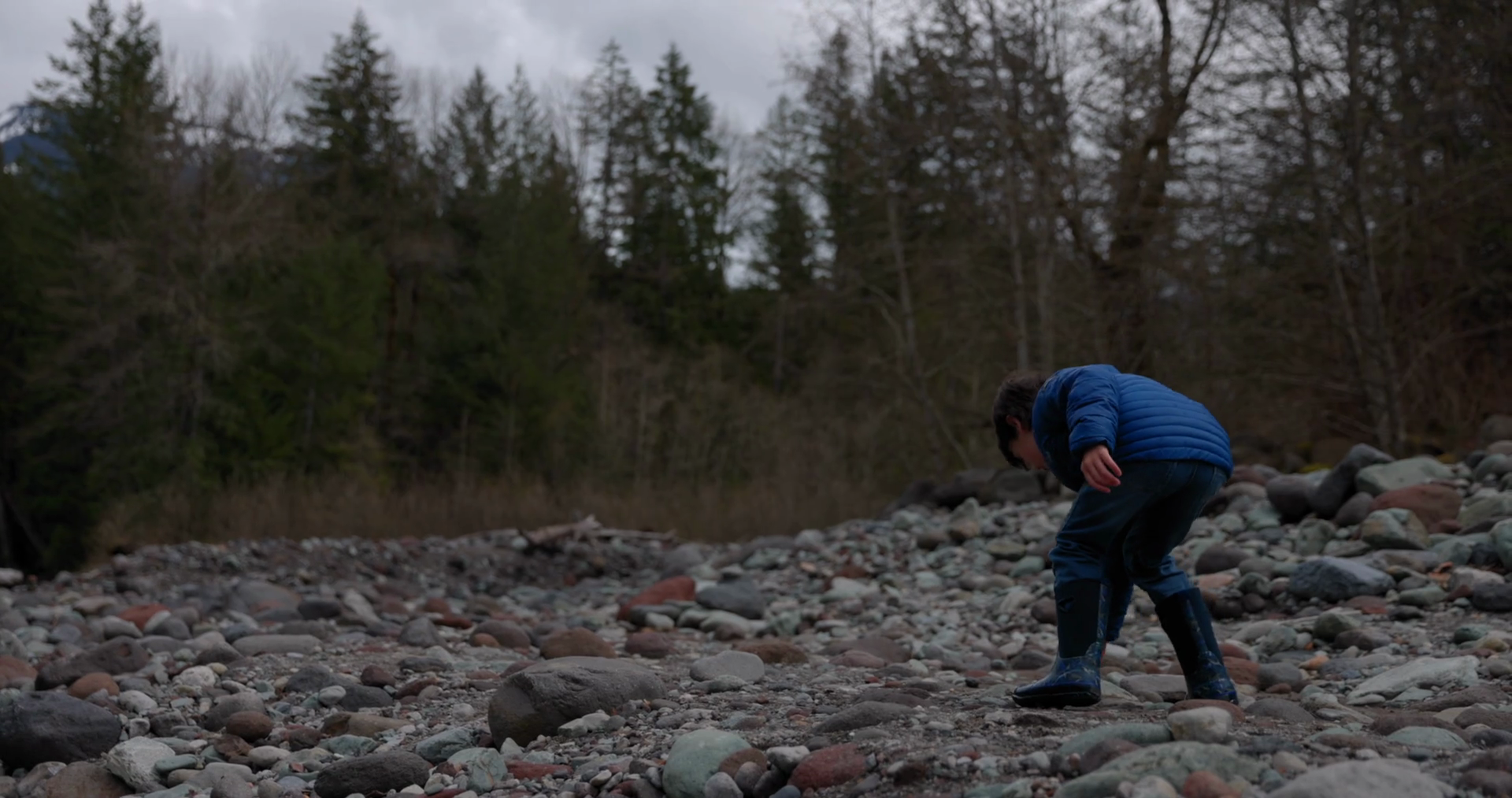 Young Boy Throws Rocks Into River Water Stock Footage SBV-347754308 ...