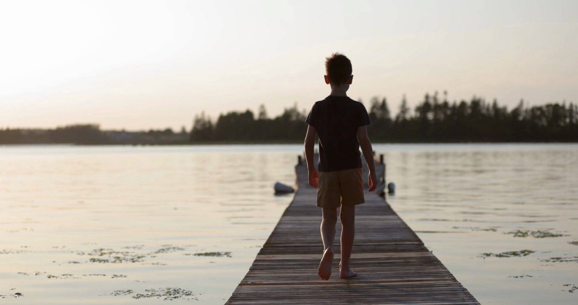 Young Boy Walking On Dock On Open Ocean Stock Footage SBV-348747905 ...