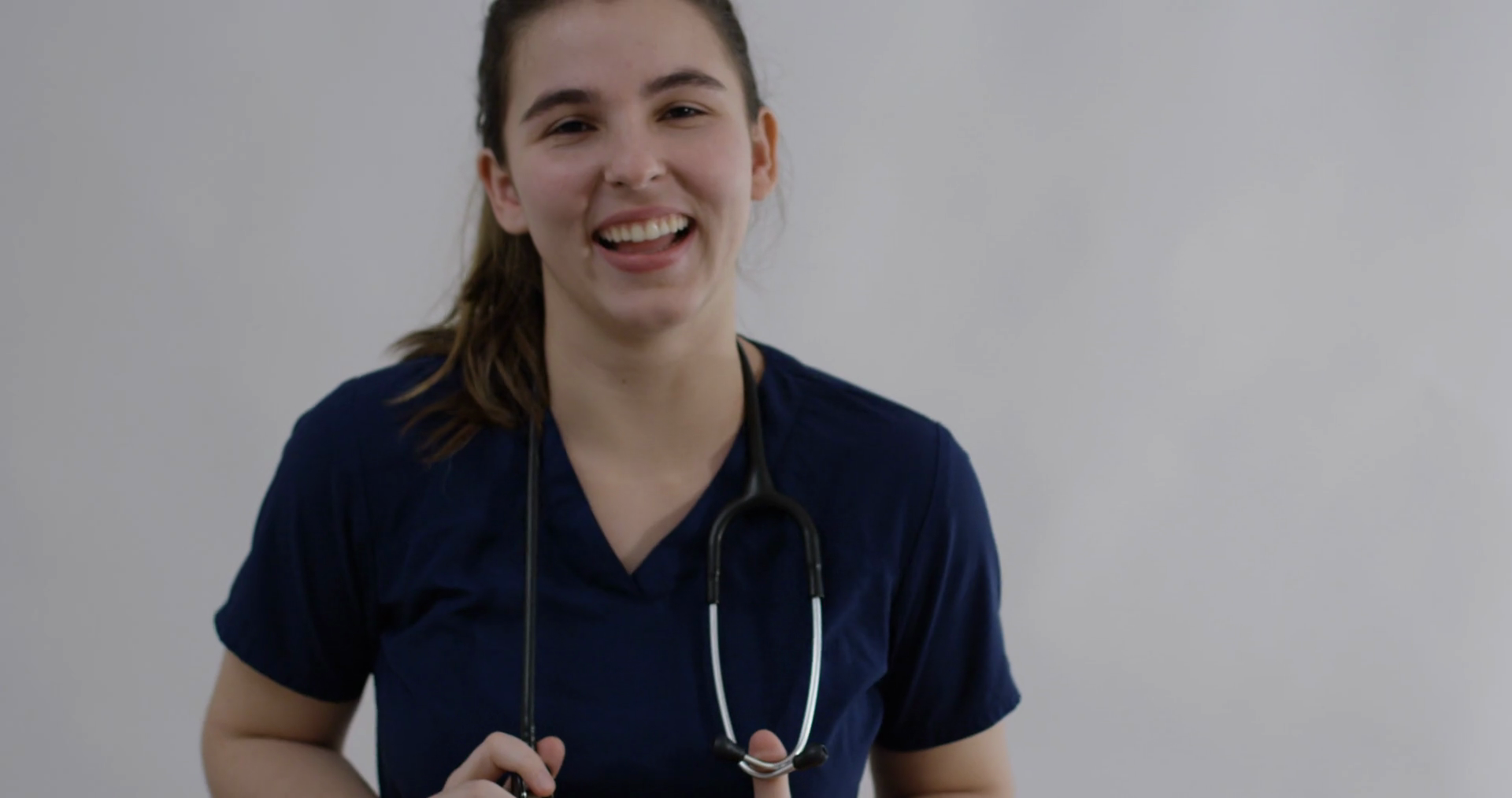 Young Nurse Laughing Looking Directly Into Stock Footage SBV-348450444 ...