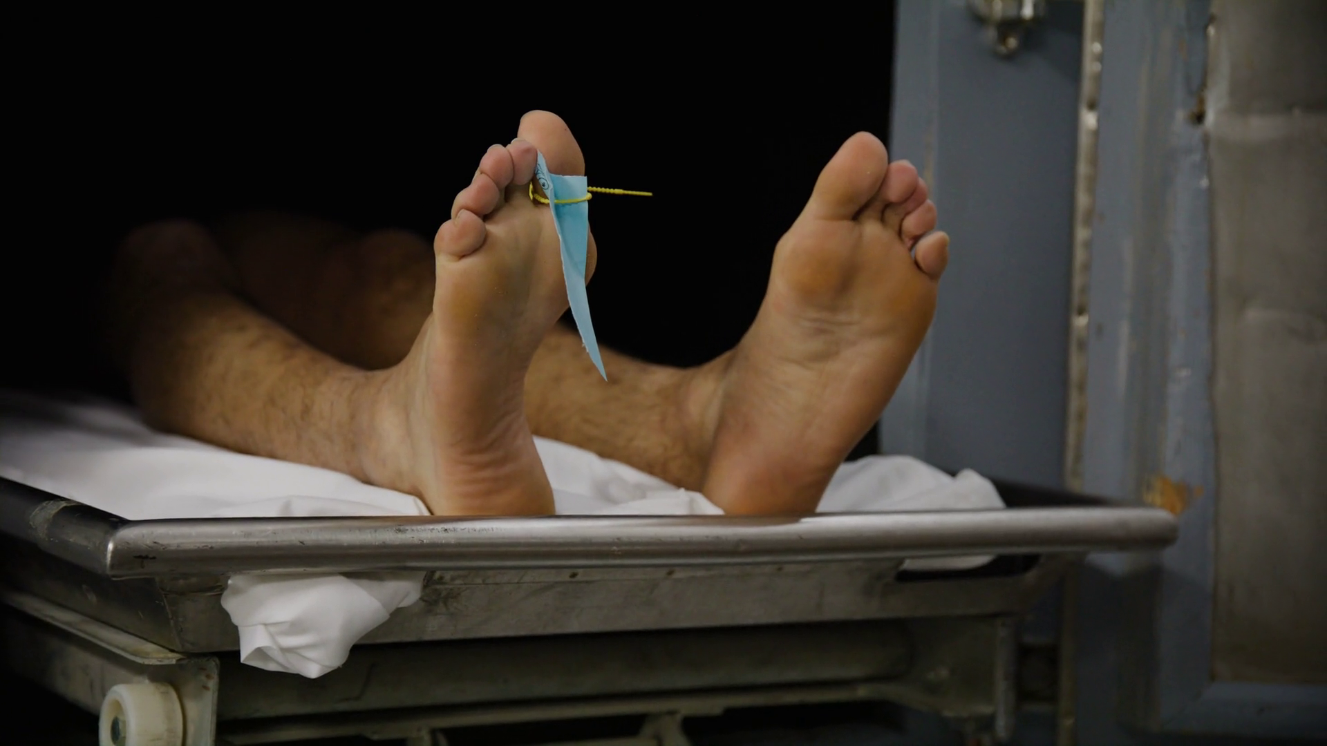 Feet In Morgue Cooler With Toe Tags Stock Footage SBV-351671794 ...