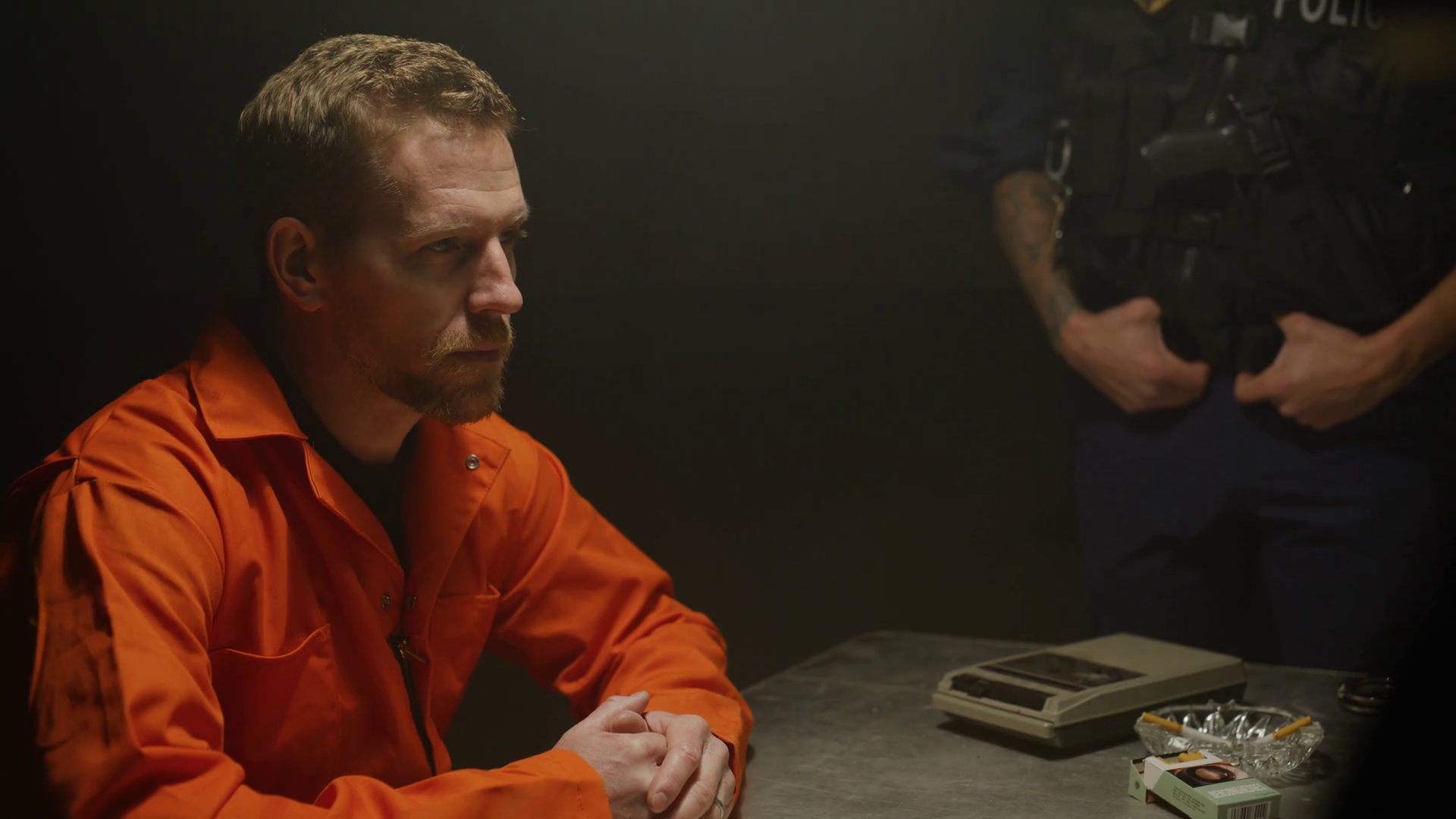 Group Of Policemen Questioning Inmate During Stock Footage SBV ...