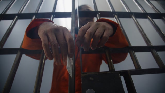 Man In Jail Stock Footage: Royalty-Free Video Clips - Storyblocks