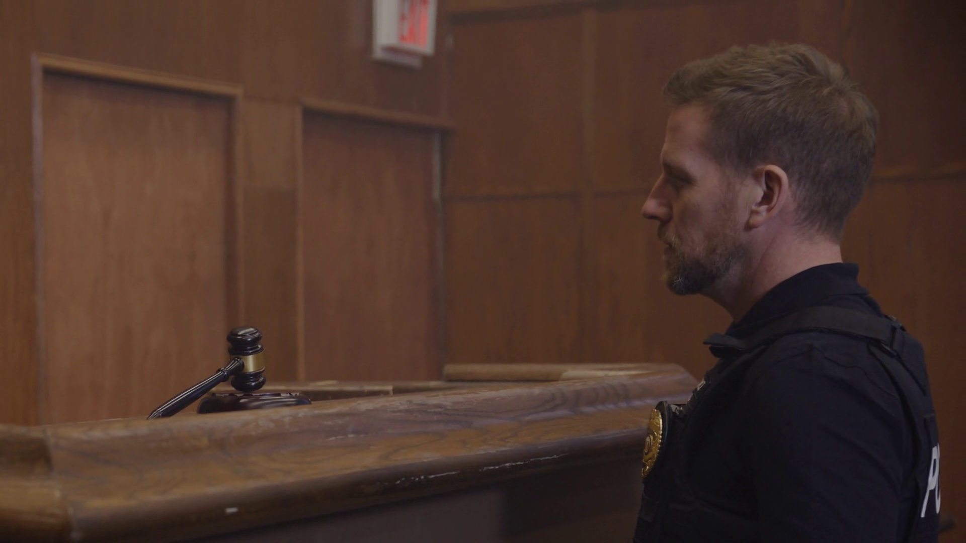 Side View Of Police Officer In Court Room At Stock Footage SBV ...