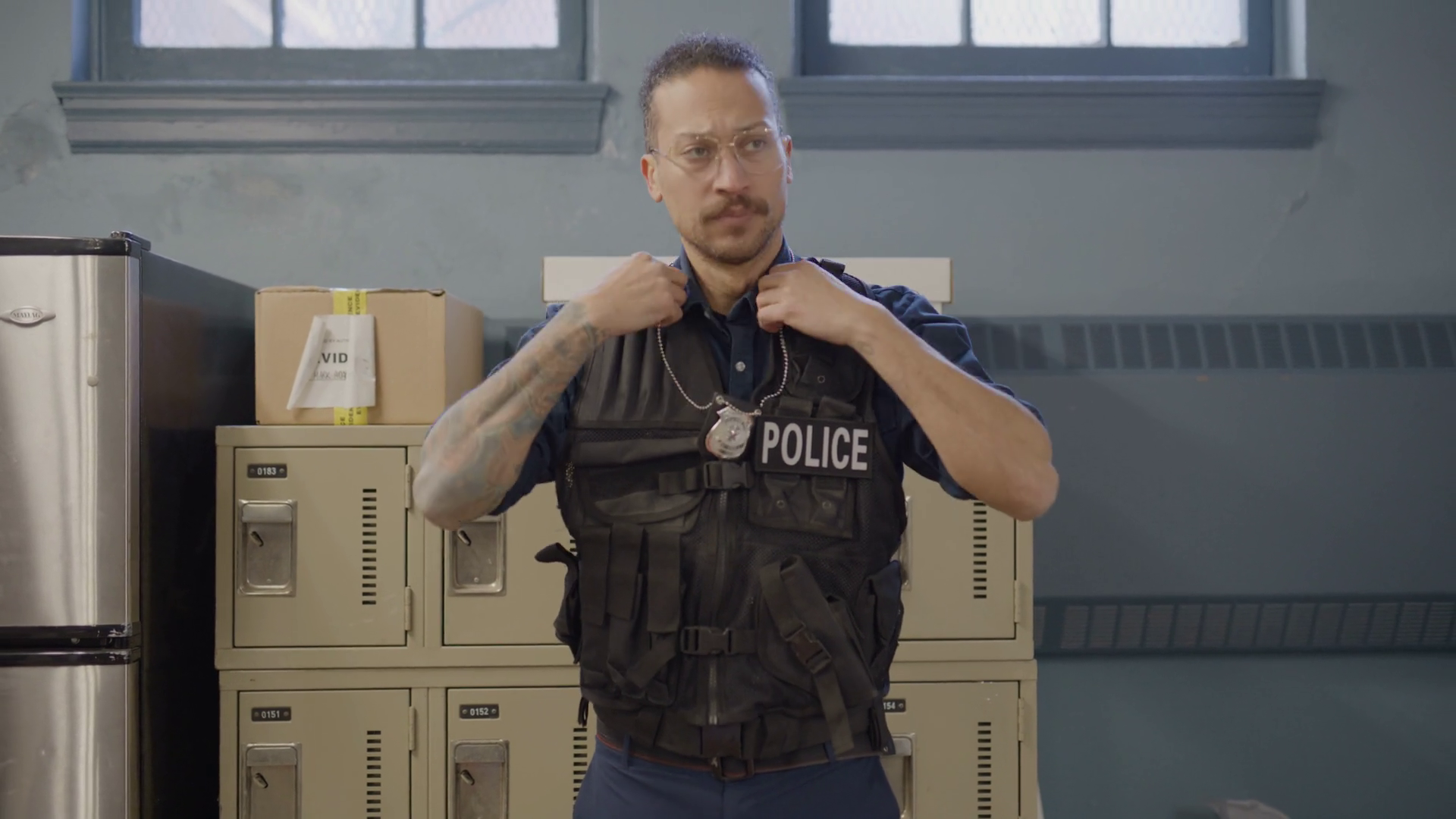 Police Officer Putting On Badge In Locker Stock Footage SBV-351671974 ...
