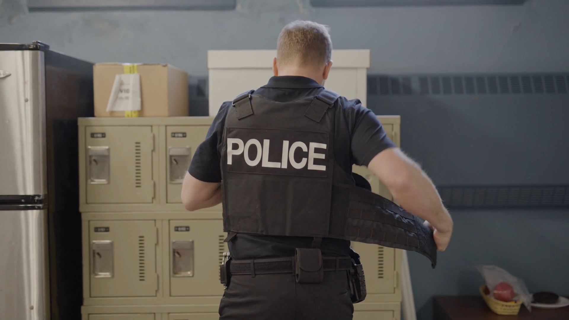 Back View Of Police Officer Taking Off Stock Footage SBV-351671985 ...