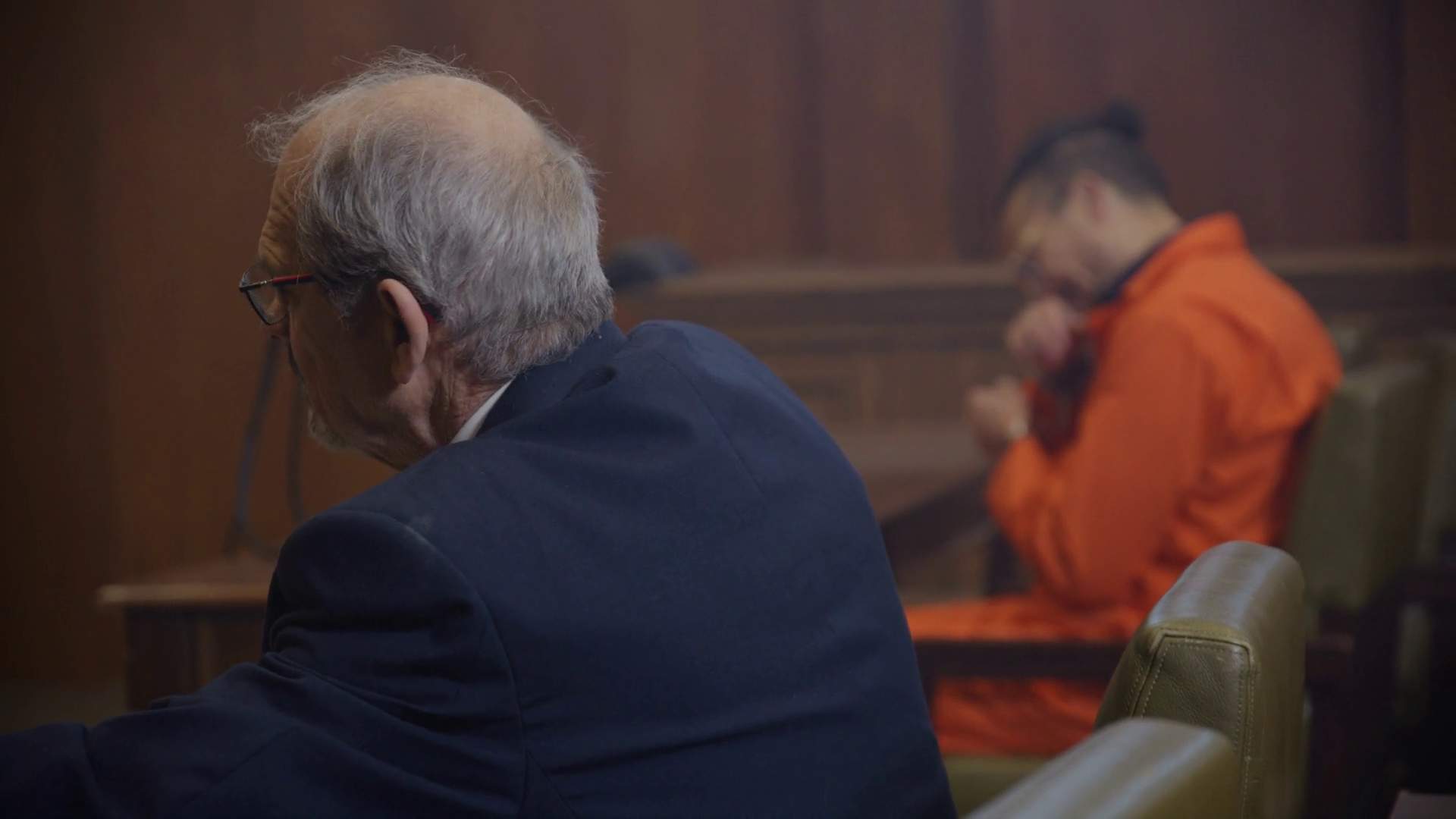 Rack Focus Zoom From Inmate In Orange Stock Footage SBV-351672072 ...