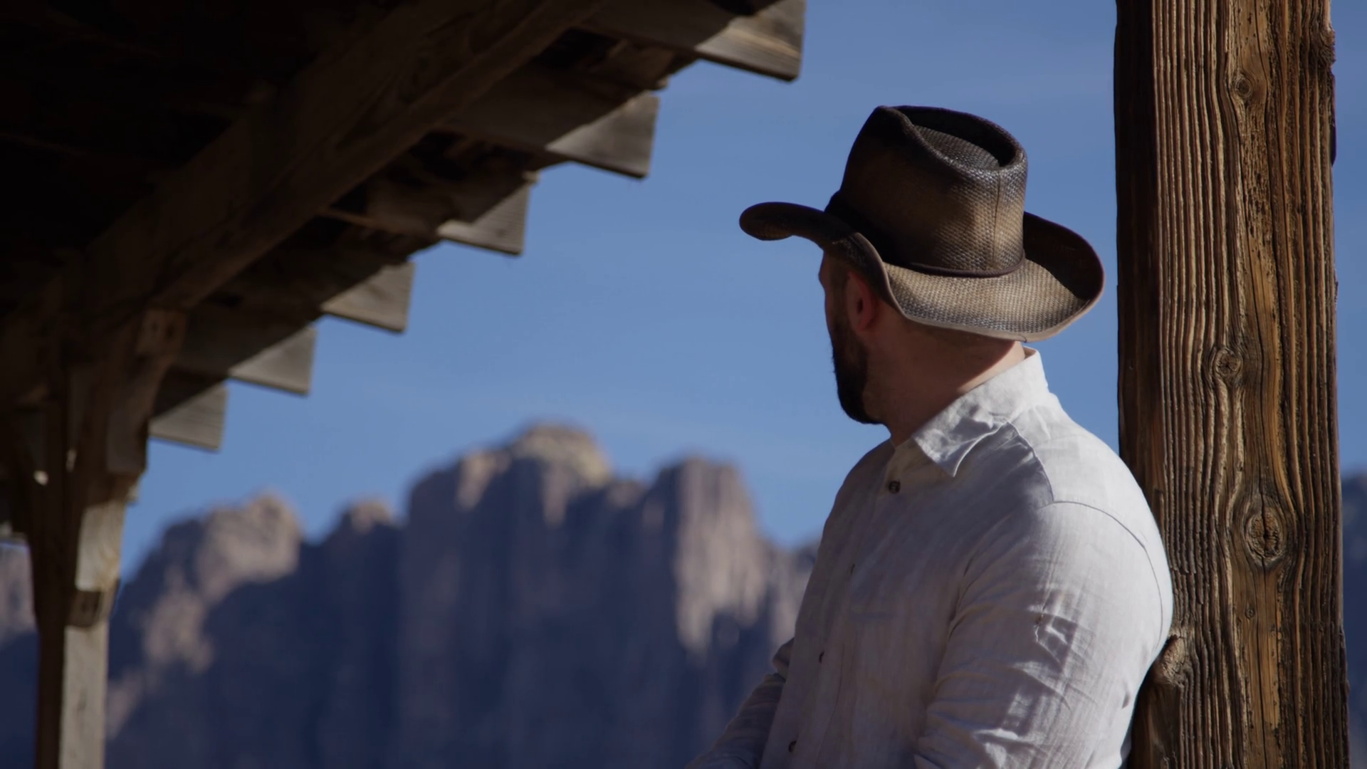 Cowboy Man Looks At Camera From Mountains On Stock Footage SBV ...
