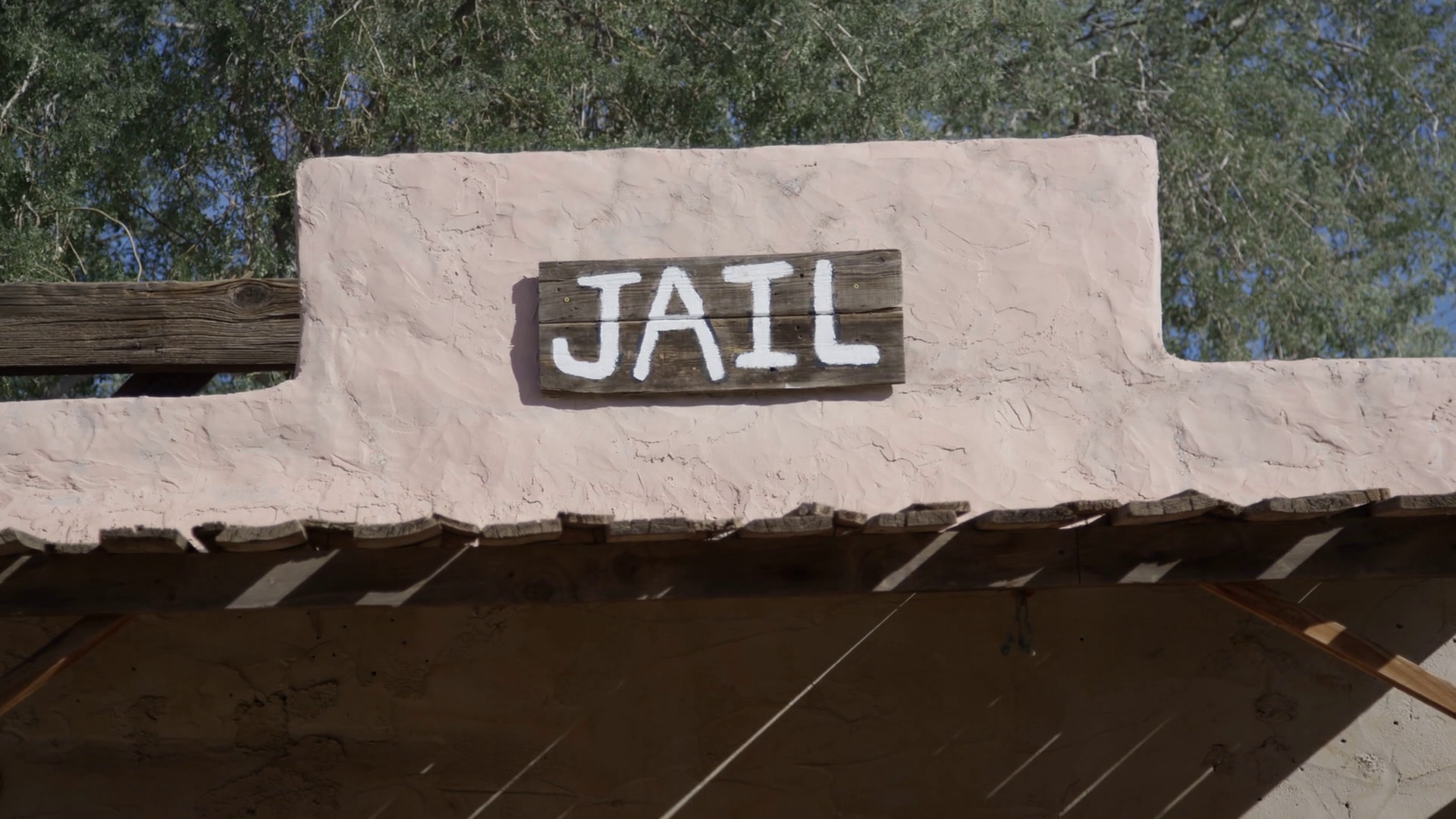 Old West Town Jail Sign Tilt Down To Barred Stock Footage SBV-352195753 ...