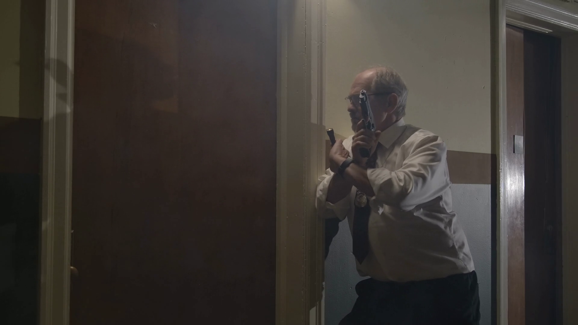 Senior Police Officer Breaching With Gun In Stock Footage SBV-353148084 ...