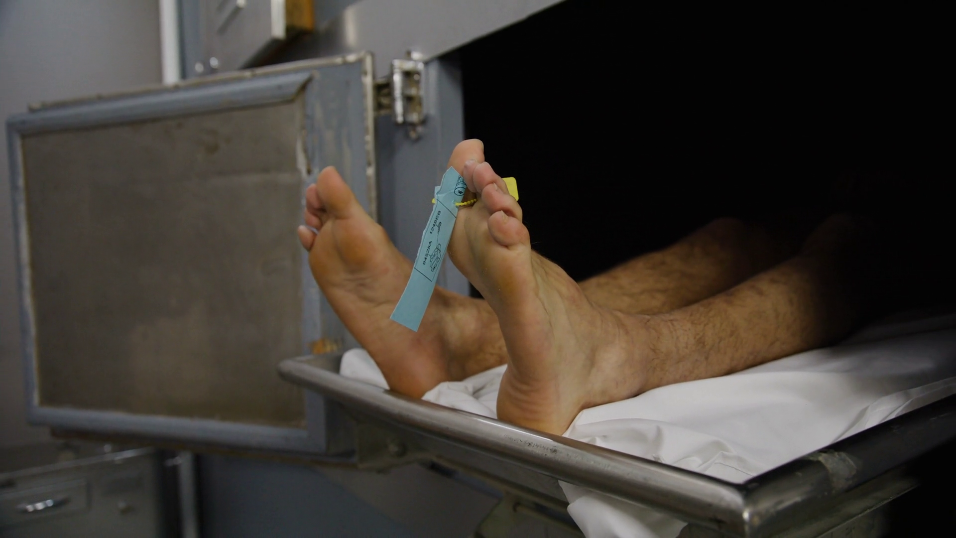 Zoom Out From Toe Tags In Morgue Stock Footage SBV-351672199 - Storyblocks