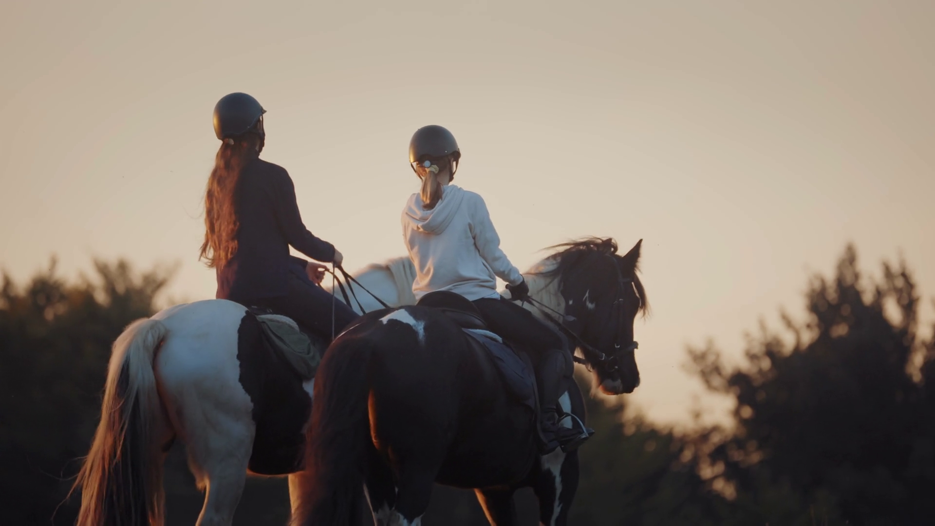 Two Young Girls Horseback Riding At Golden Stock Footage SBV-348834441 ...