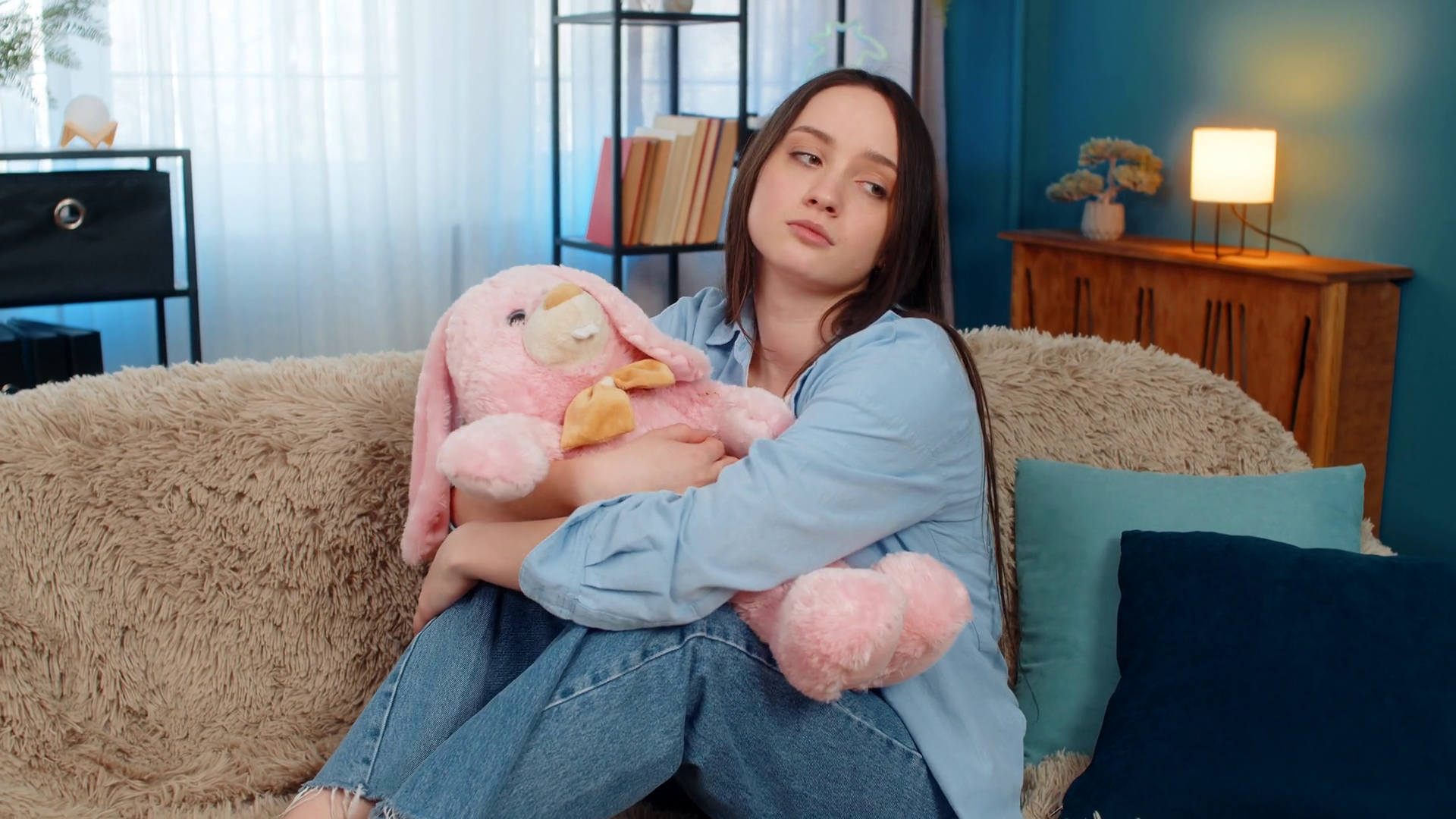 Woman On Sofa Hugging Plush Bunny Feeling Stock Footage SBV-351967958 ...