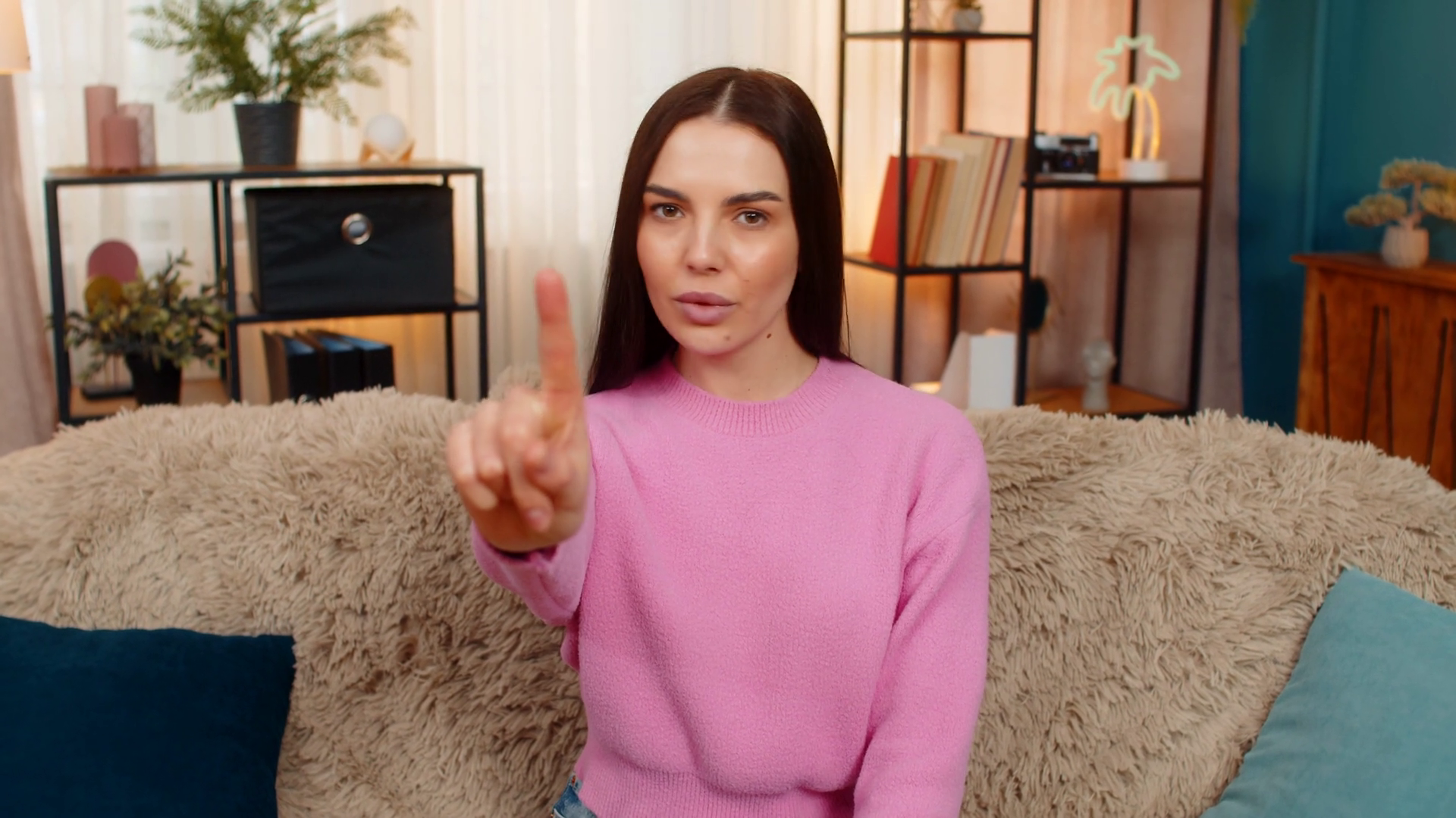 Young Woman Sitting On Sofa Waving Finger In Stock Footage SBV ...