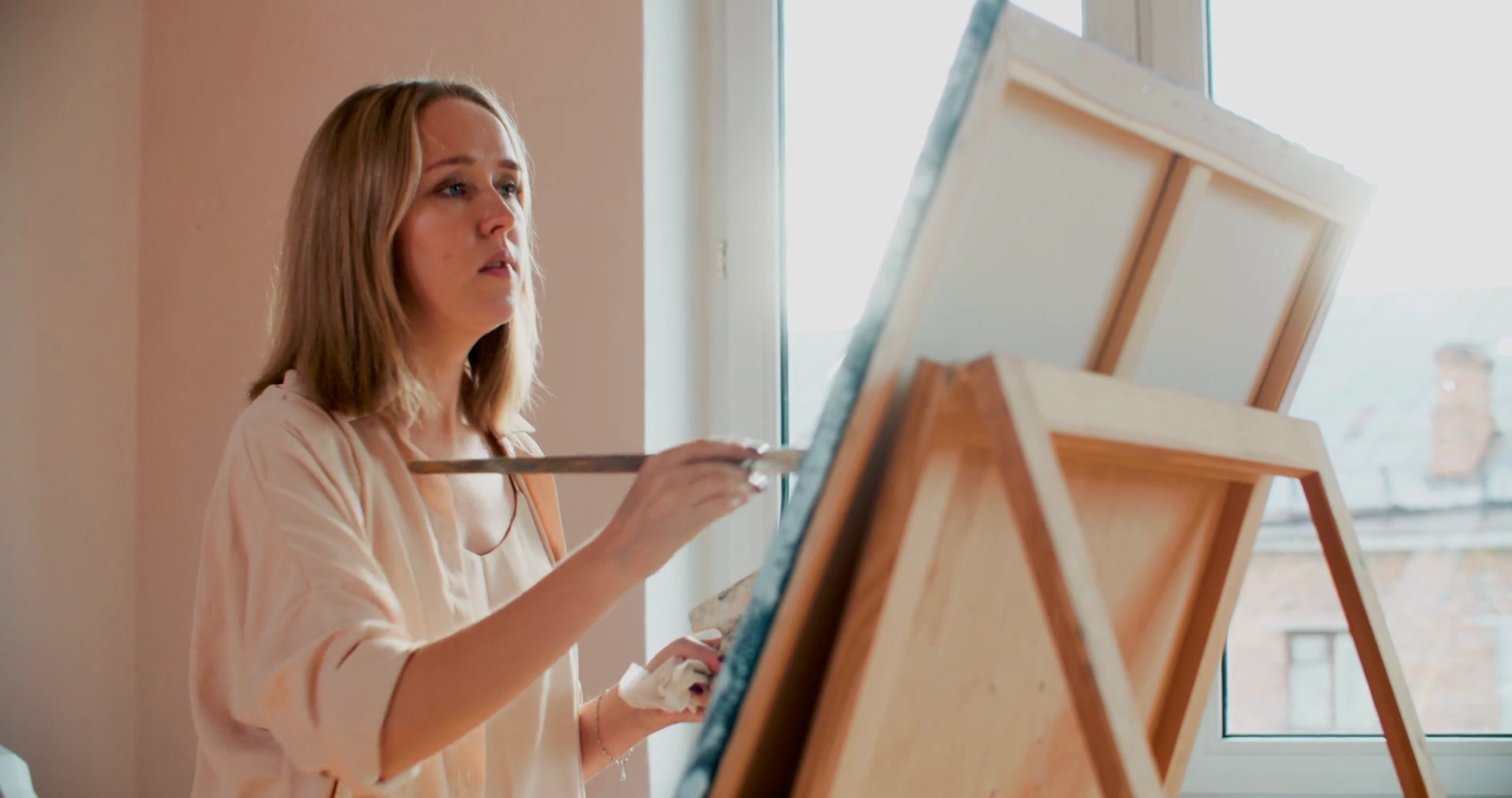 Confident Artist Painting On Canvas Standing Stock Footage SBV ...