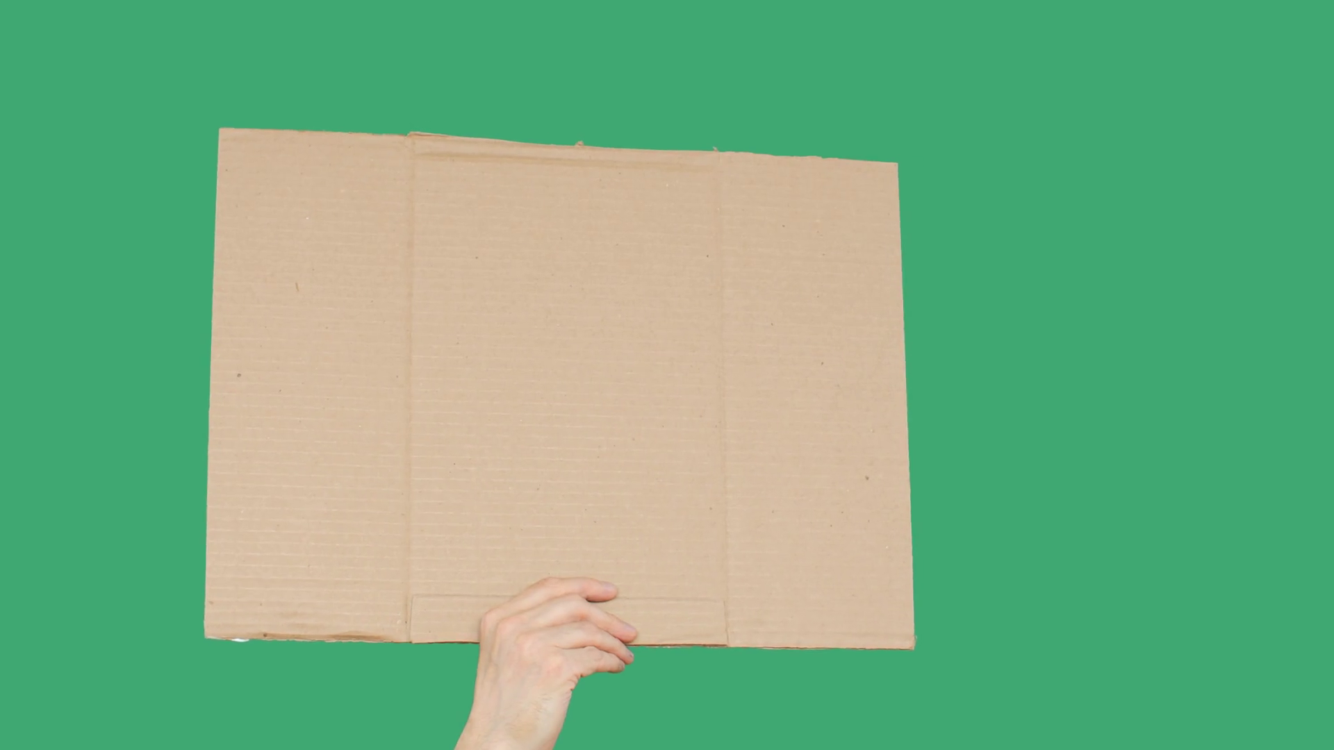 Empty cardboard human hand holding on green chromakey screen background ...