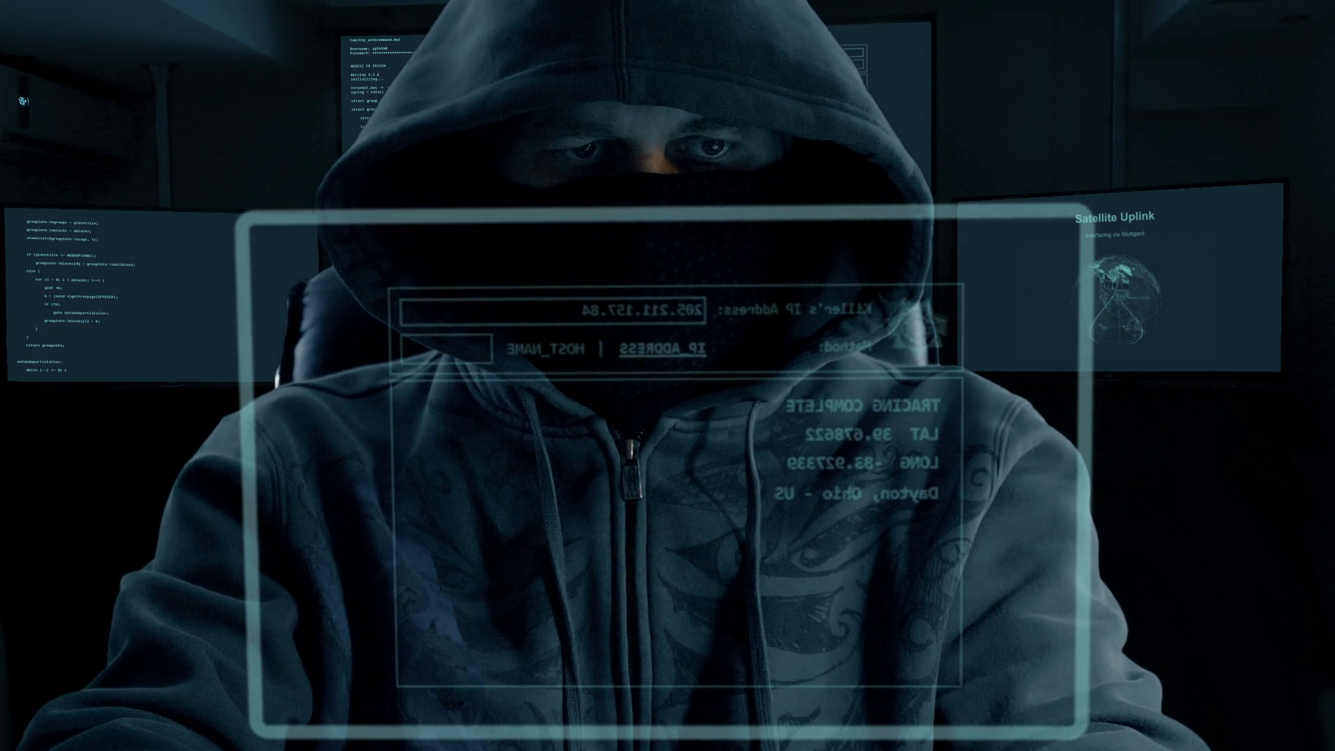 Male hacker sits in front of virtual screen in monitor room and do IP ...