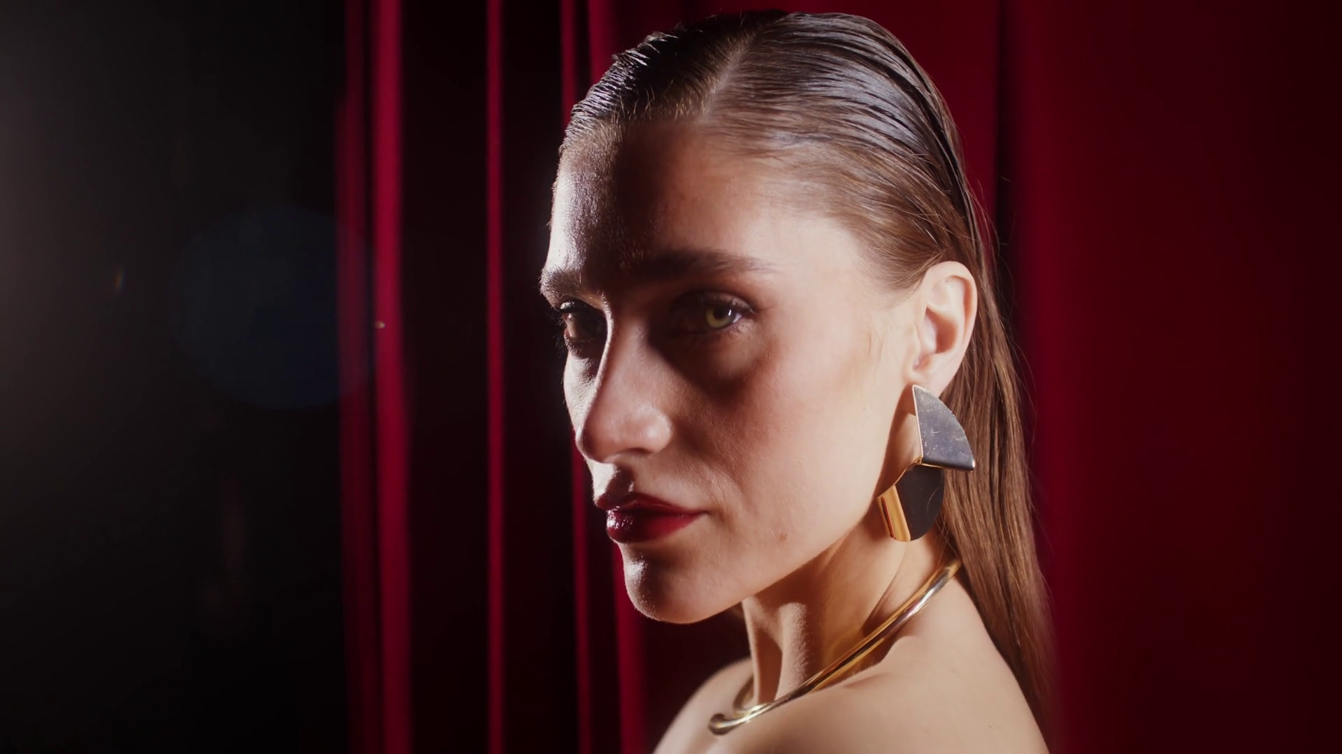 A Stylish Woman In Gold Jewelry Poses Stock Footage SBV-352080639 ...