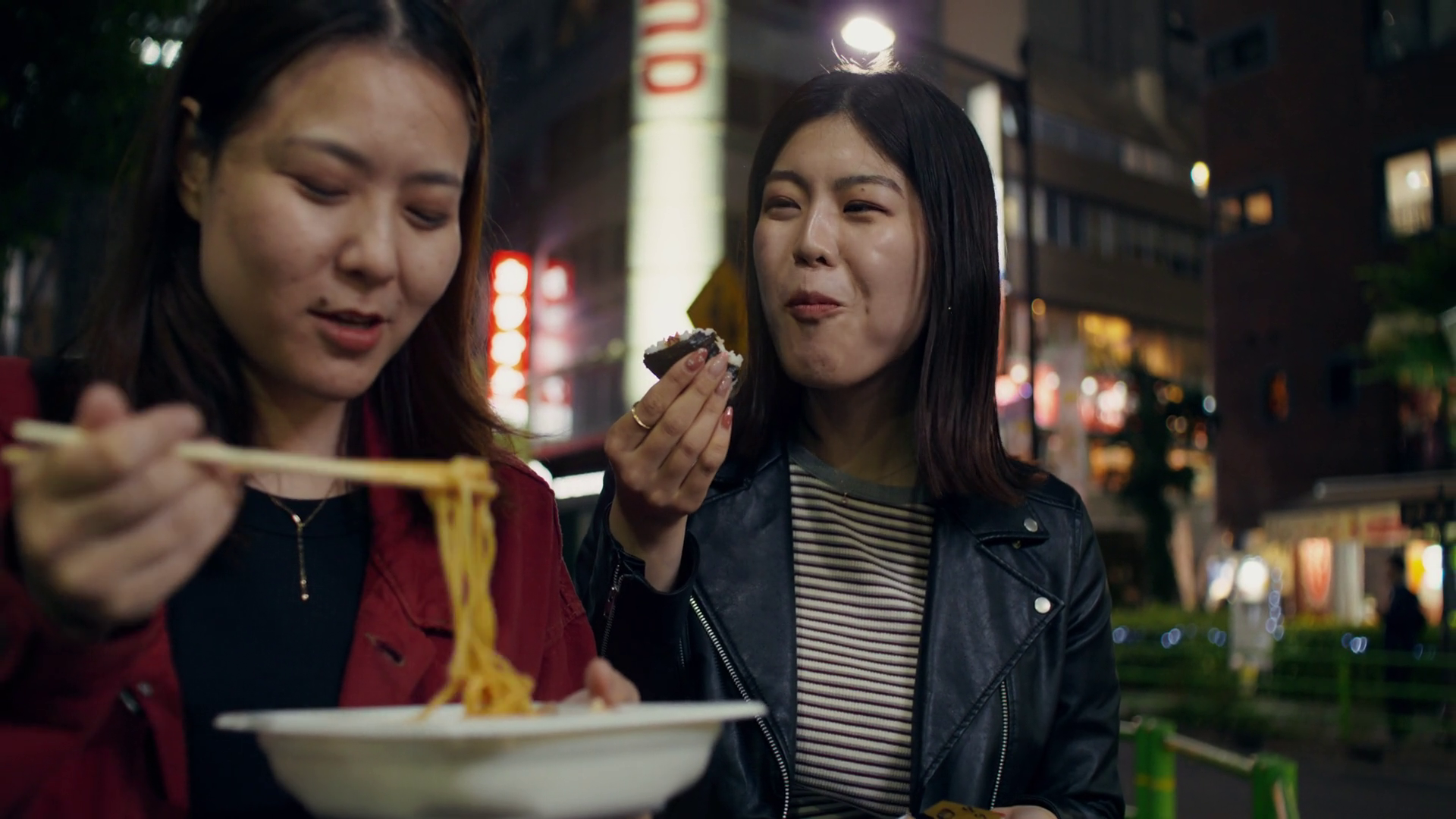 Two Women Are Eating Standing On City Street Stock Footage SBV ...