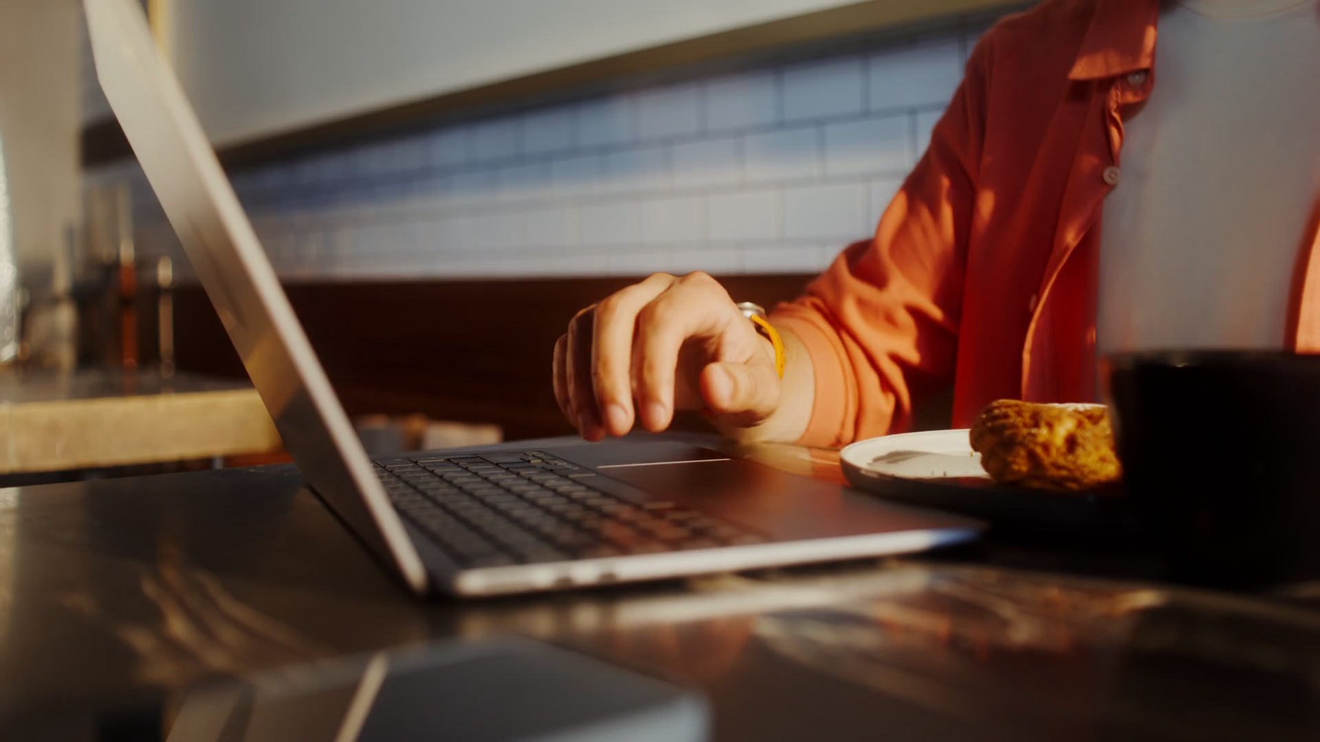A Man Uses Laptop Sitting At Table In Cafe Stock Footage SBV-347807366 ...