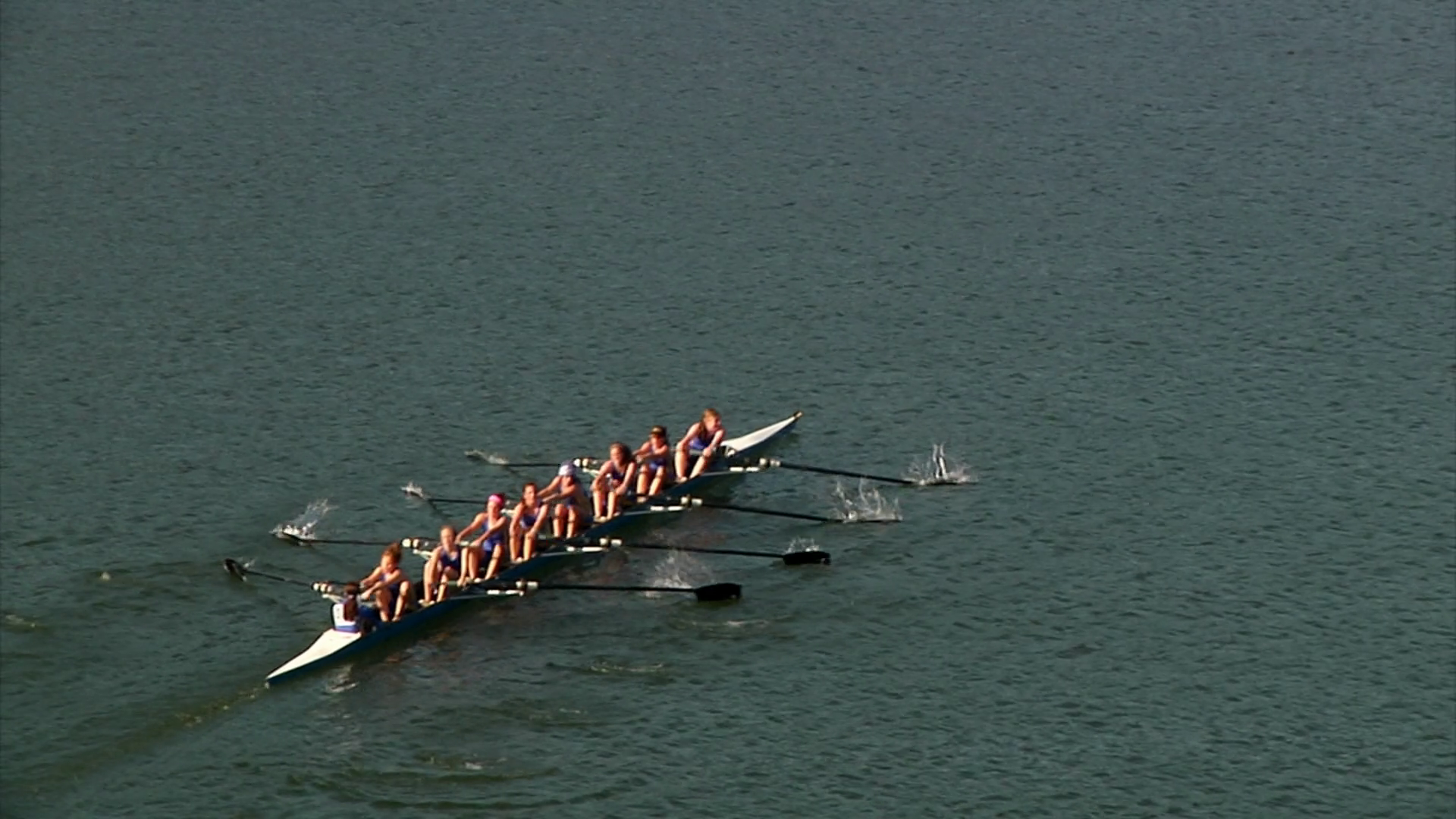 Crew Team Rows In Unison On River Stock Footage SBV-300272924 - Storyblocks