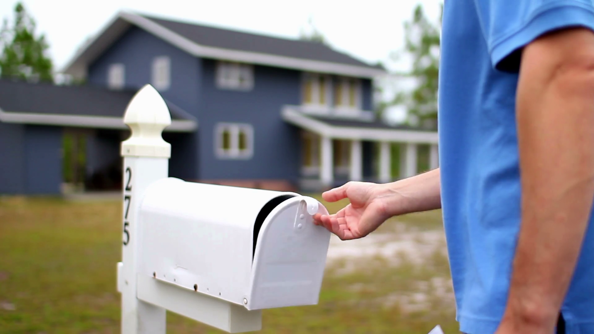 Man Checks Mail Outside Of Home Stock Footage SBV-300230926 - Storyblocks