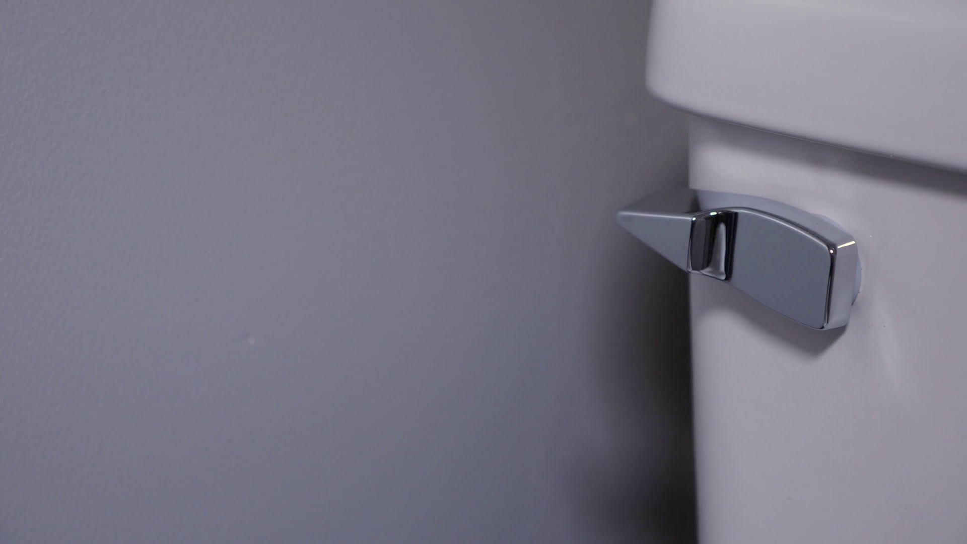 A Close Up Dolly Shot Of Person Flushing Stock Footage SBV-338105016 ...