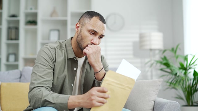 Man Crying While Reading Letter Stock Footage: Royalty-Free Video Clips ...