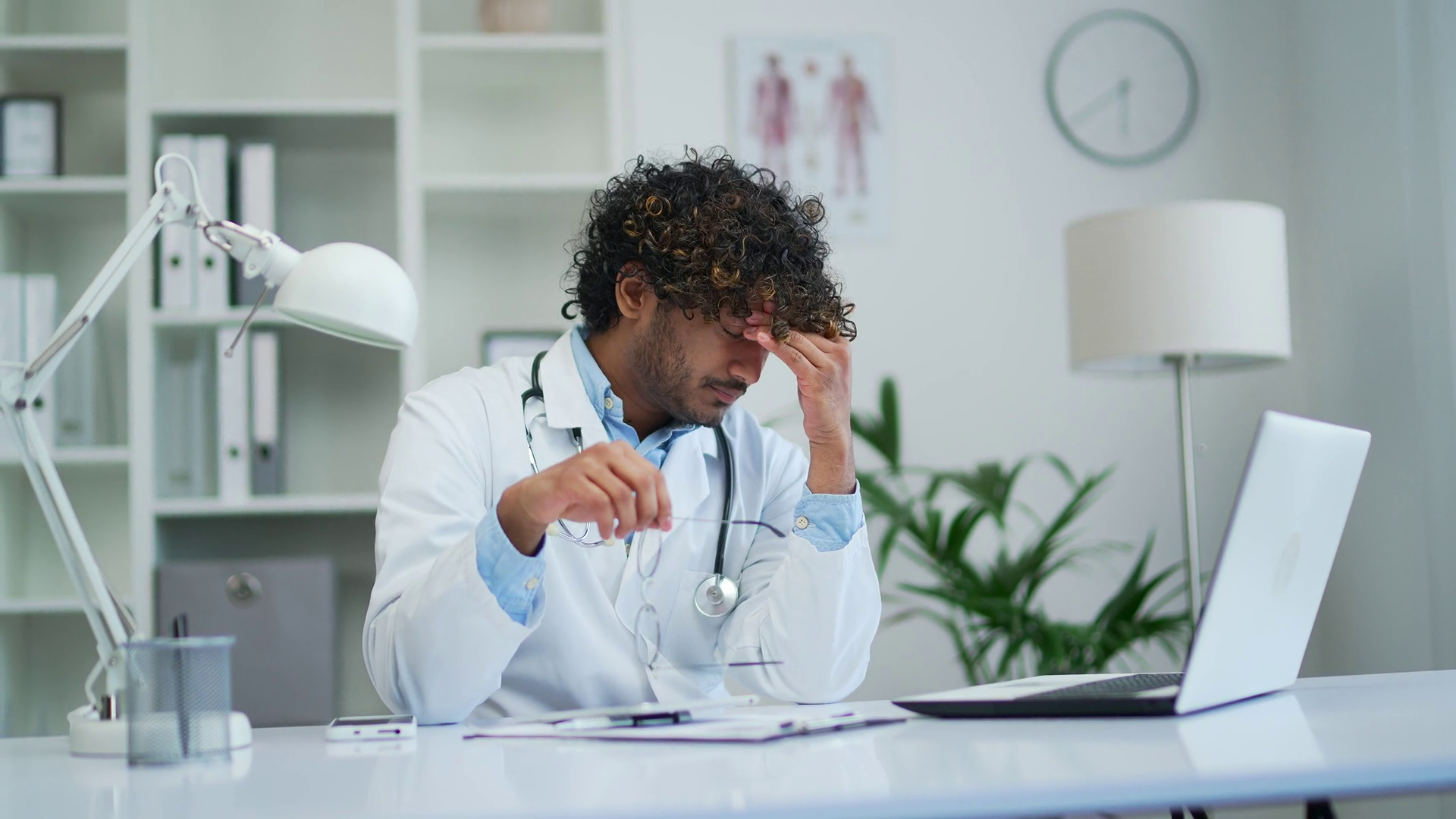 Tired Doctor At Workplace In Office Of Stock Footage SBV-351996871 ...