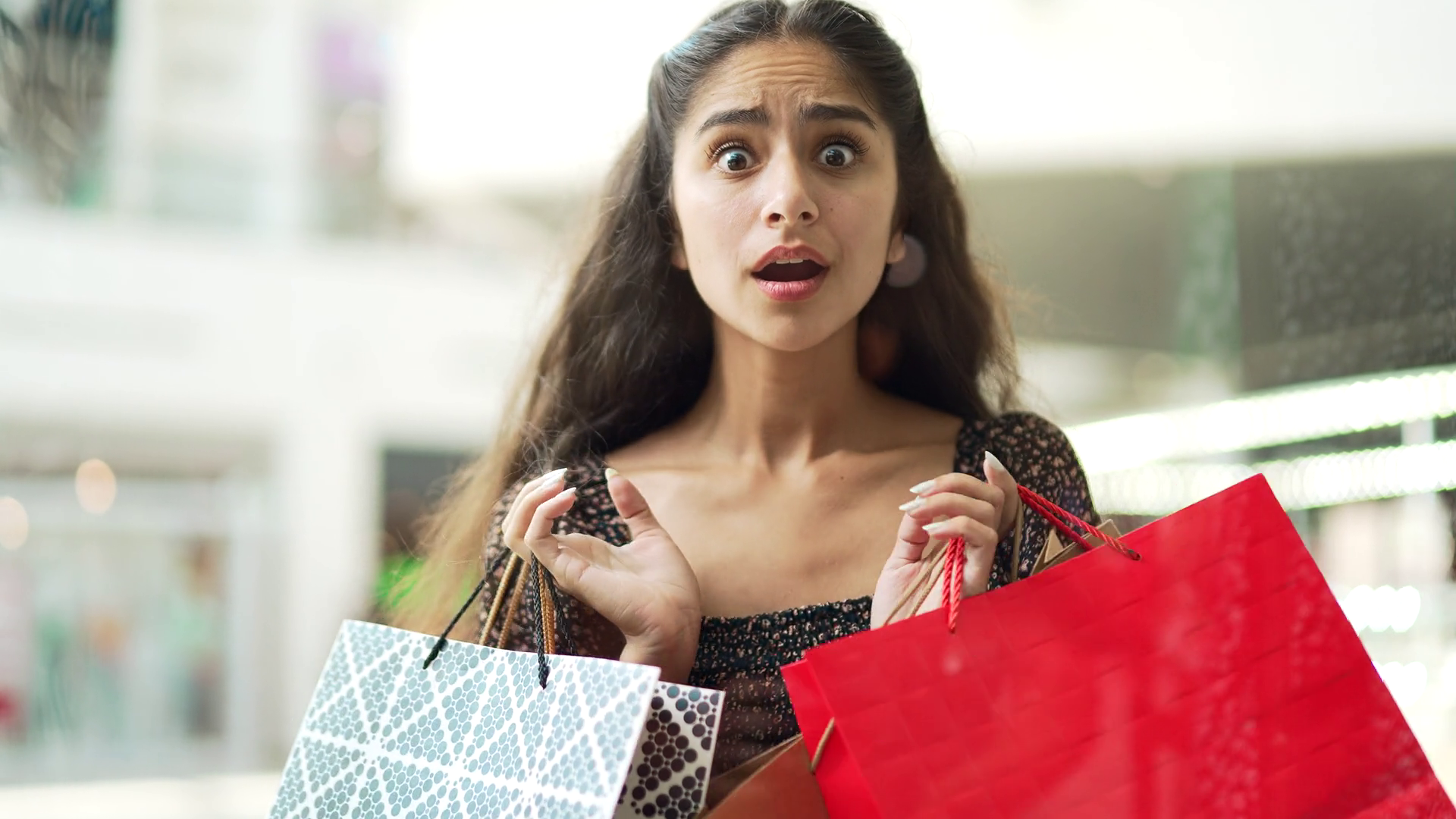 Surprised Young Woman Customer Looks At Shop Stock Footage SBV ...