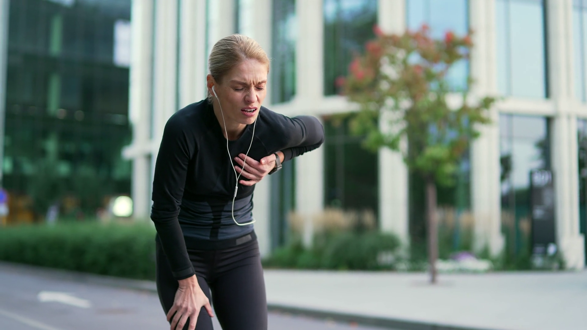 Female Runner Having Heart Attack Chest Pain Stock Footage SBV ...