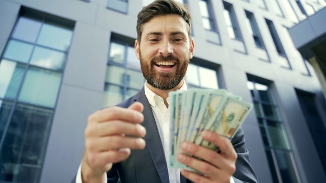 Show Off Money Stock Footage: Royalty-Free Video Clips - Storyblocks