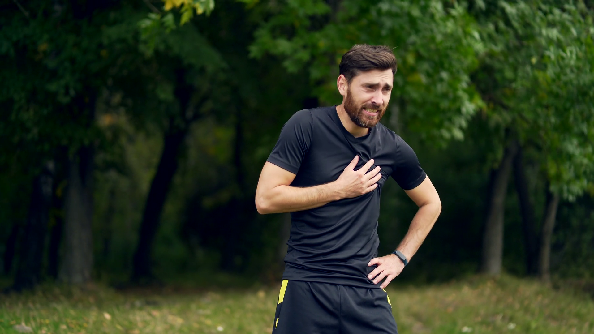 Young Adult Athlete Jogging Chest Injury Stock Footage SBV-351683271 ...