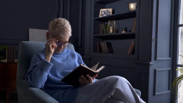 Thoughtful Reading Stock Footage: Royalty-Free Video Clips - Storyblocks