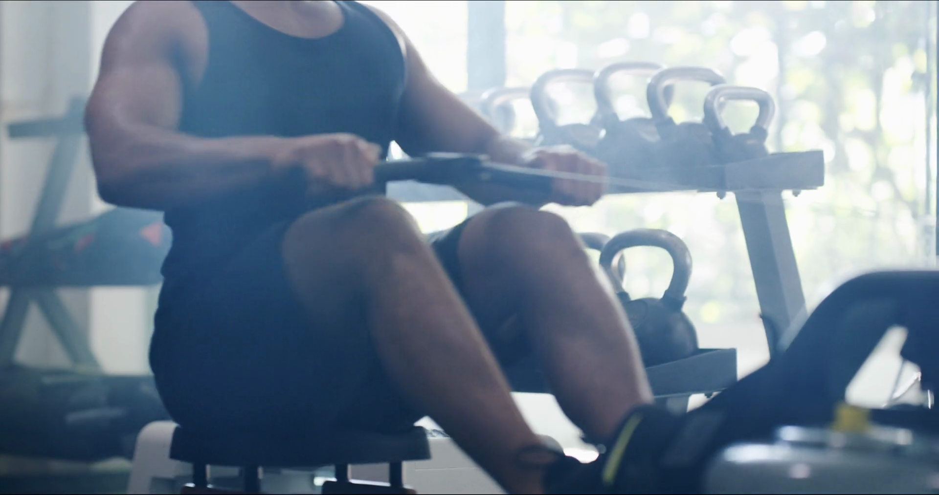 Man Leg Rowing Machine In Gym With Workout Stock Footage SBV-353199686 ...