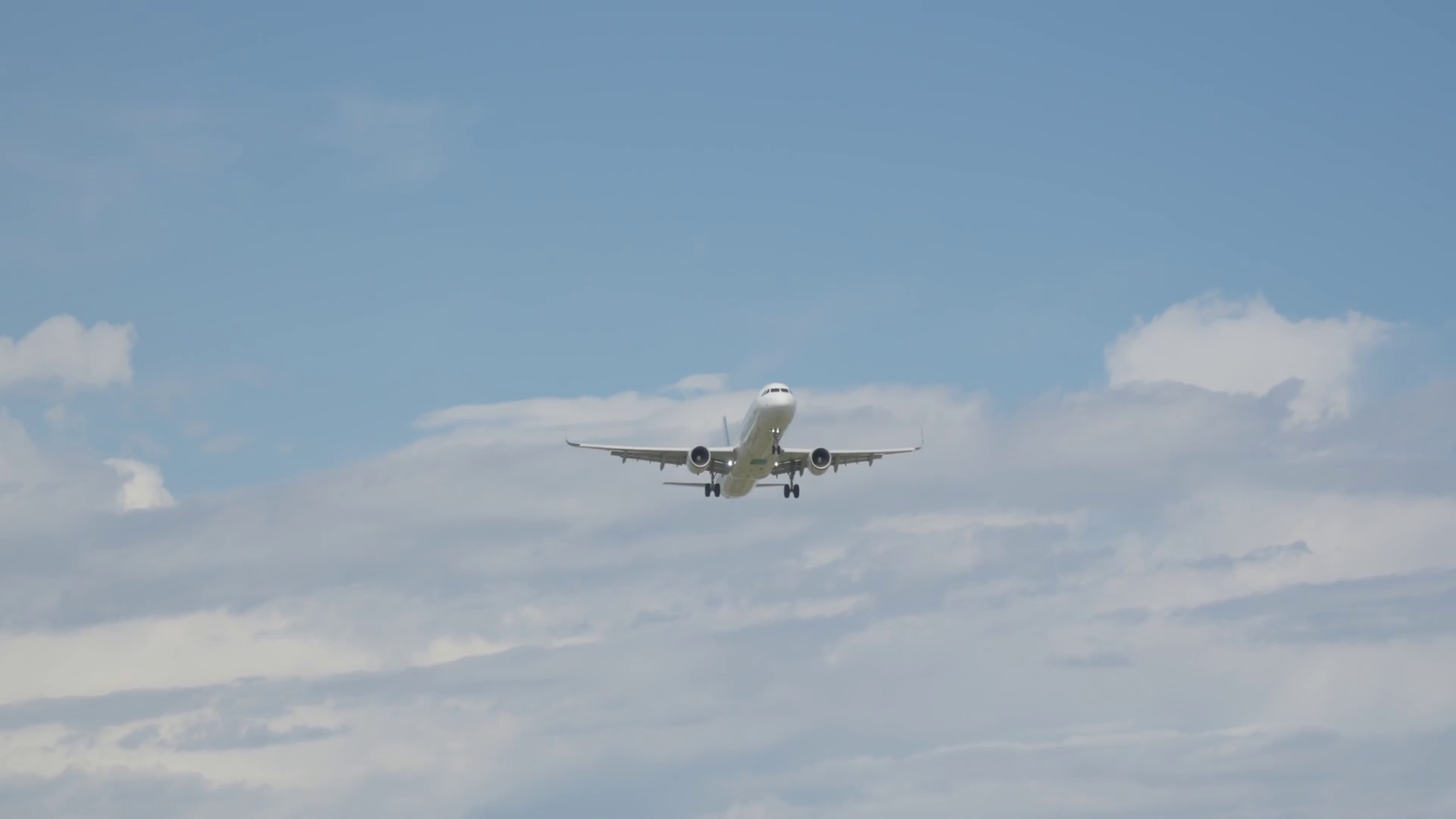 A Commercial Jet Flying Through Clear Blue Stock Footage SBV-348487935 ...