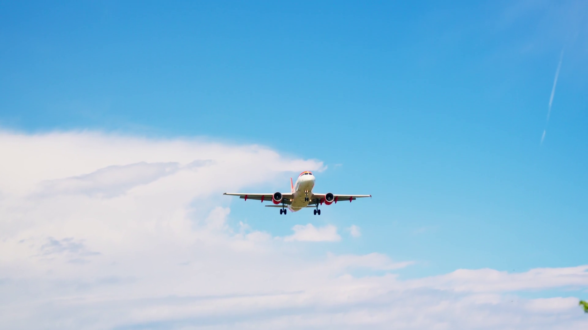 A Commercial Jet Flying Through Clear Blue Stock Footage SBV-348384857 ...