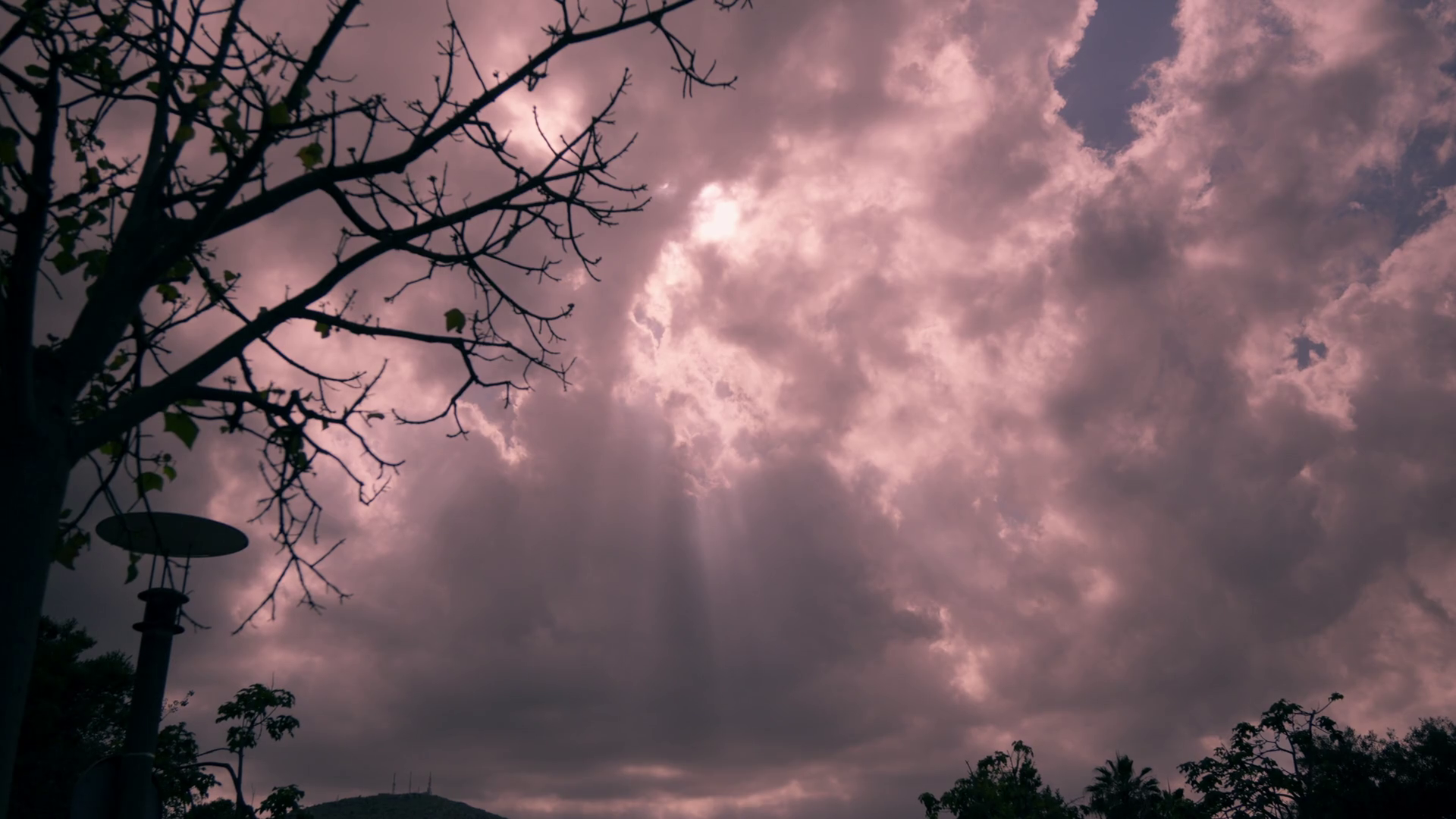 The Sky With Clouds Piercing Rays Of Sun Stock Footage SBV-348414166 ...