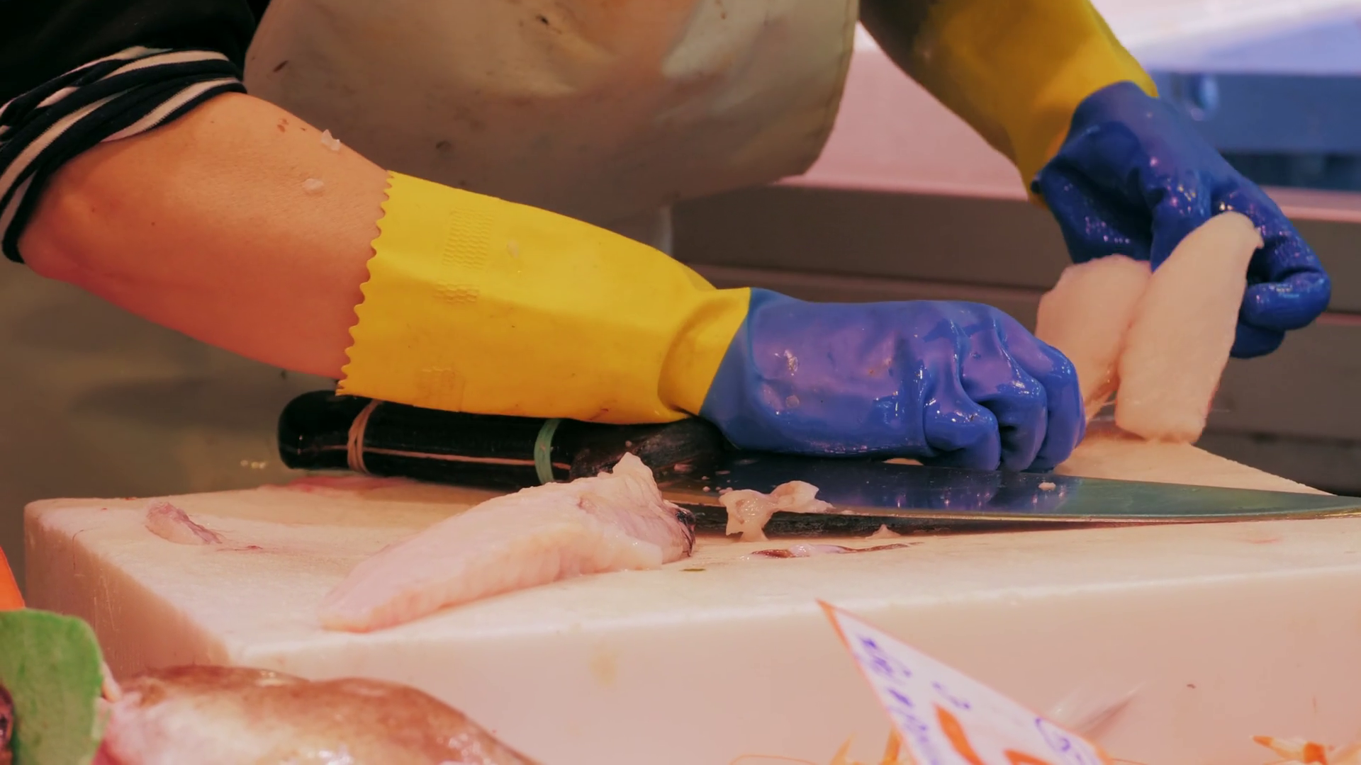 Watch Butcher With Protective Gear Filleting Stock Footage SBV ...