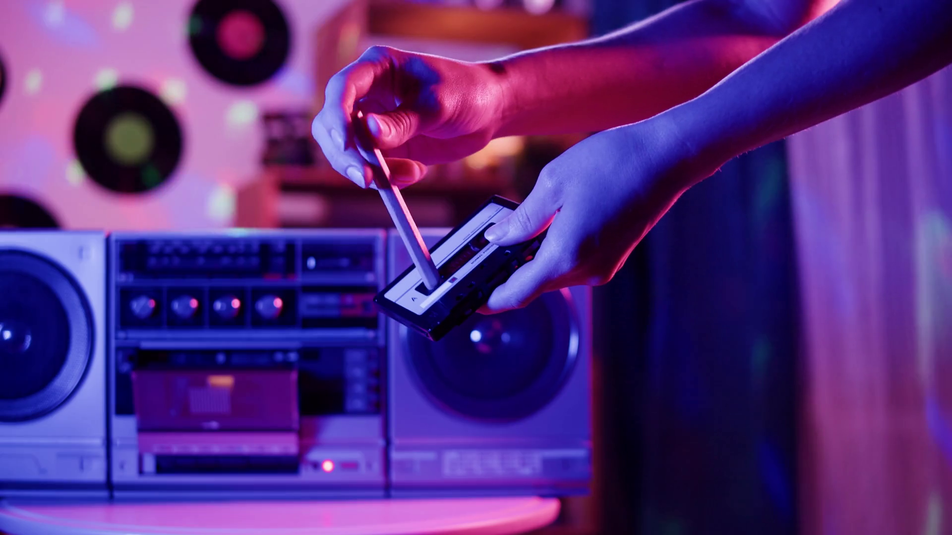 Retro radio tape recorder, putting cassette close-up. Listening to ...