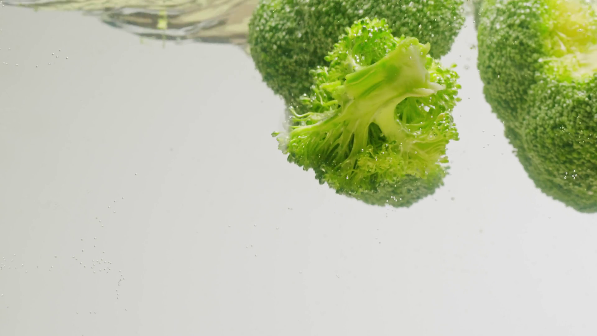 Green Broccoli Falling In Boiling Water Stock Footage SBV-347705080 ...